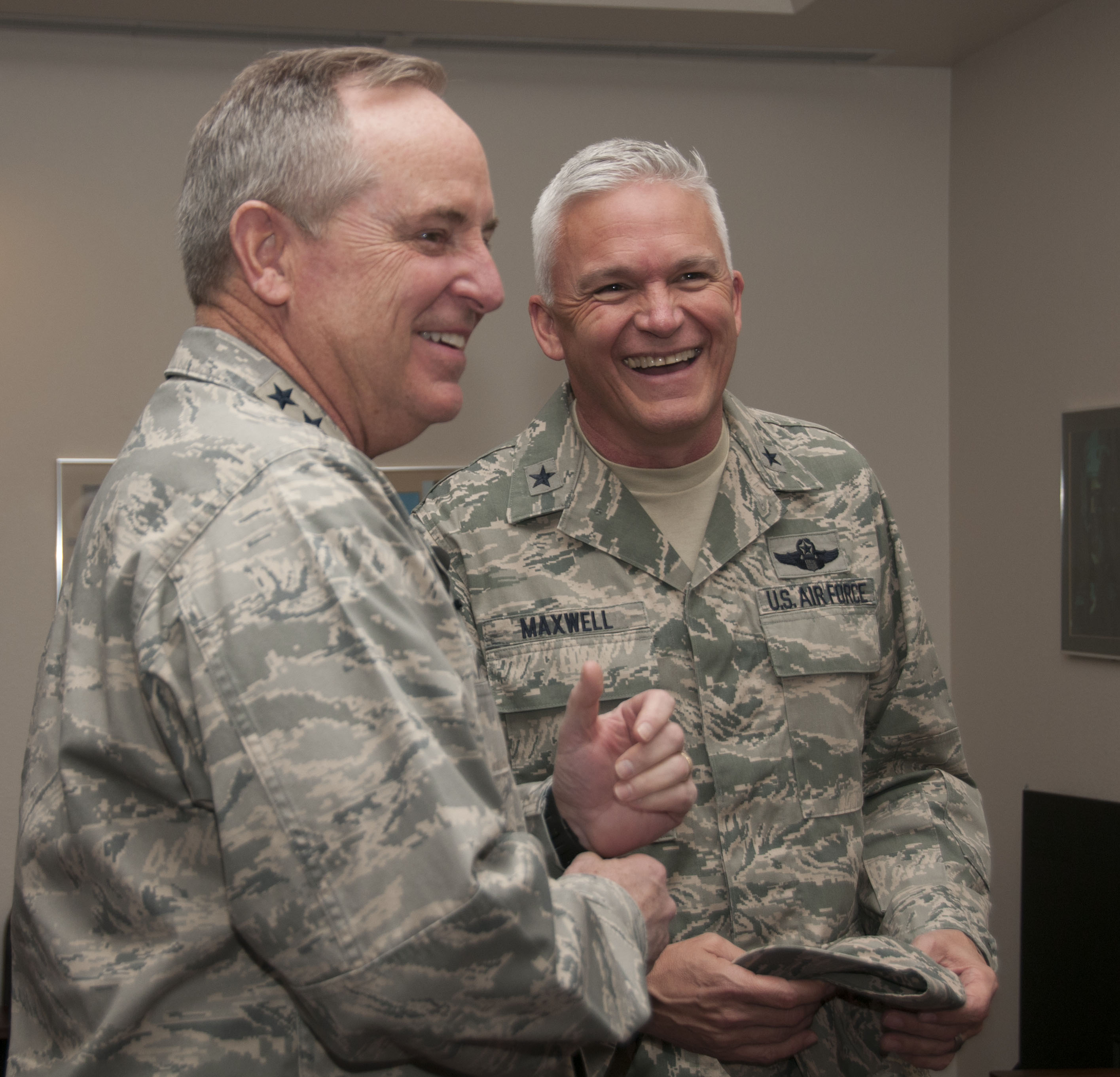 Air Force Chief of Staff Gen. Mark A. Welsh III visits with Gen. Edward P. Maxwell, the ...