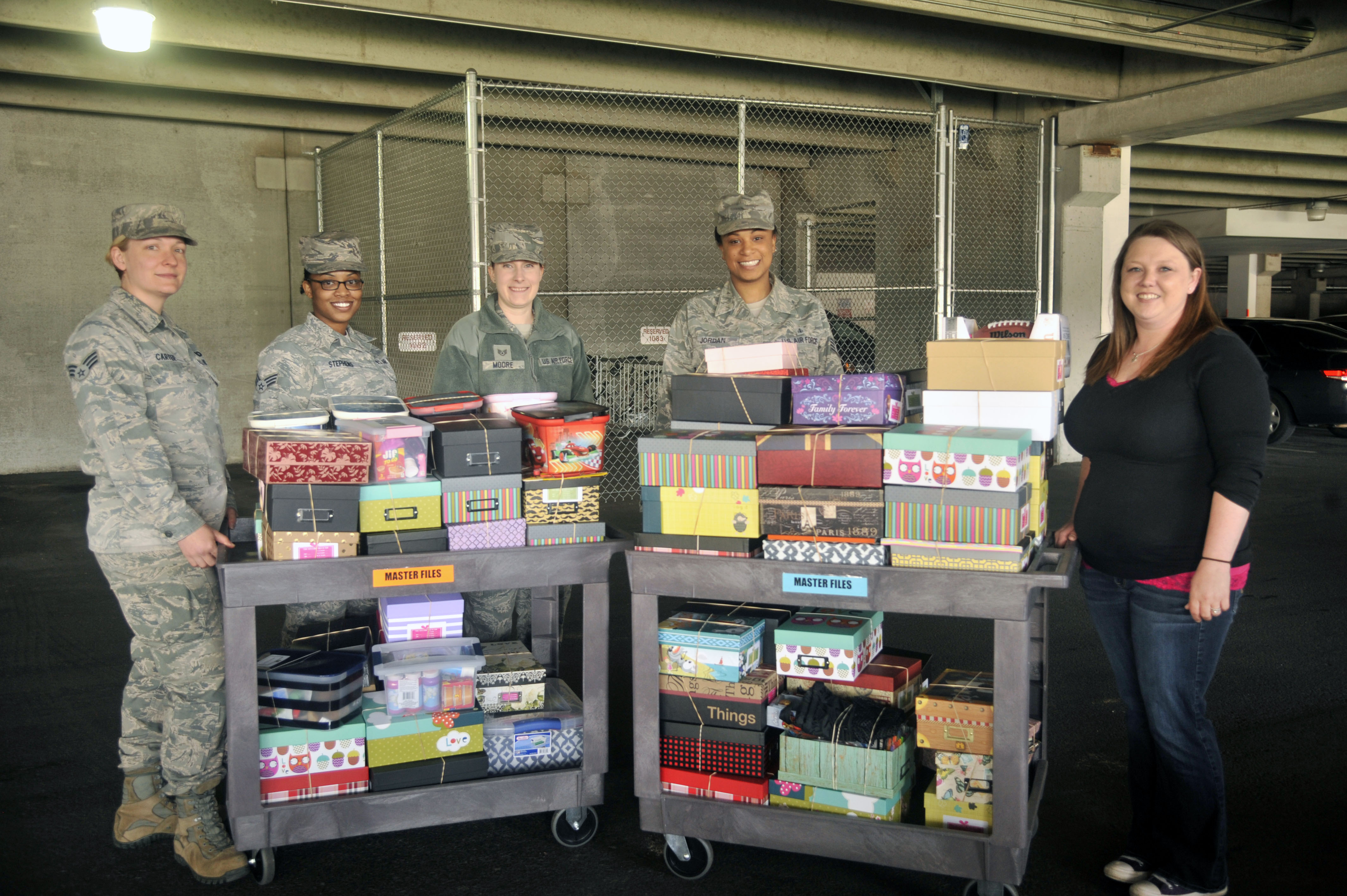 Team Fairchild donates 'Welcome Boxes' to local foster children ...