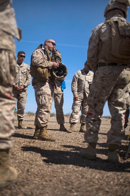 Marine Corps Lt. Col. Thomas M. Warren, center, commander of 1st ...