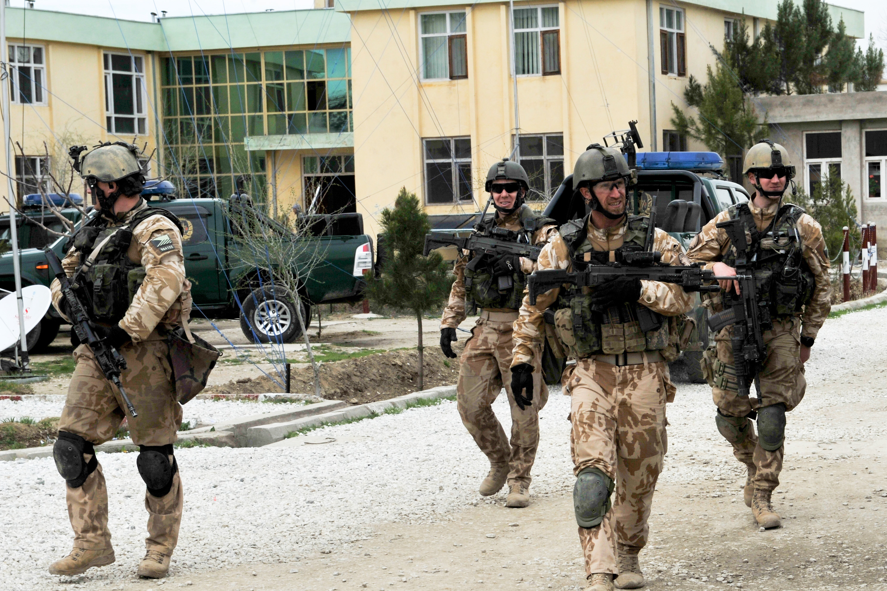 Czech soldiers provide security during a meeting with the Bagram ...