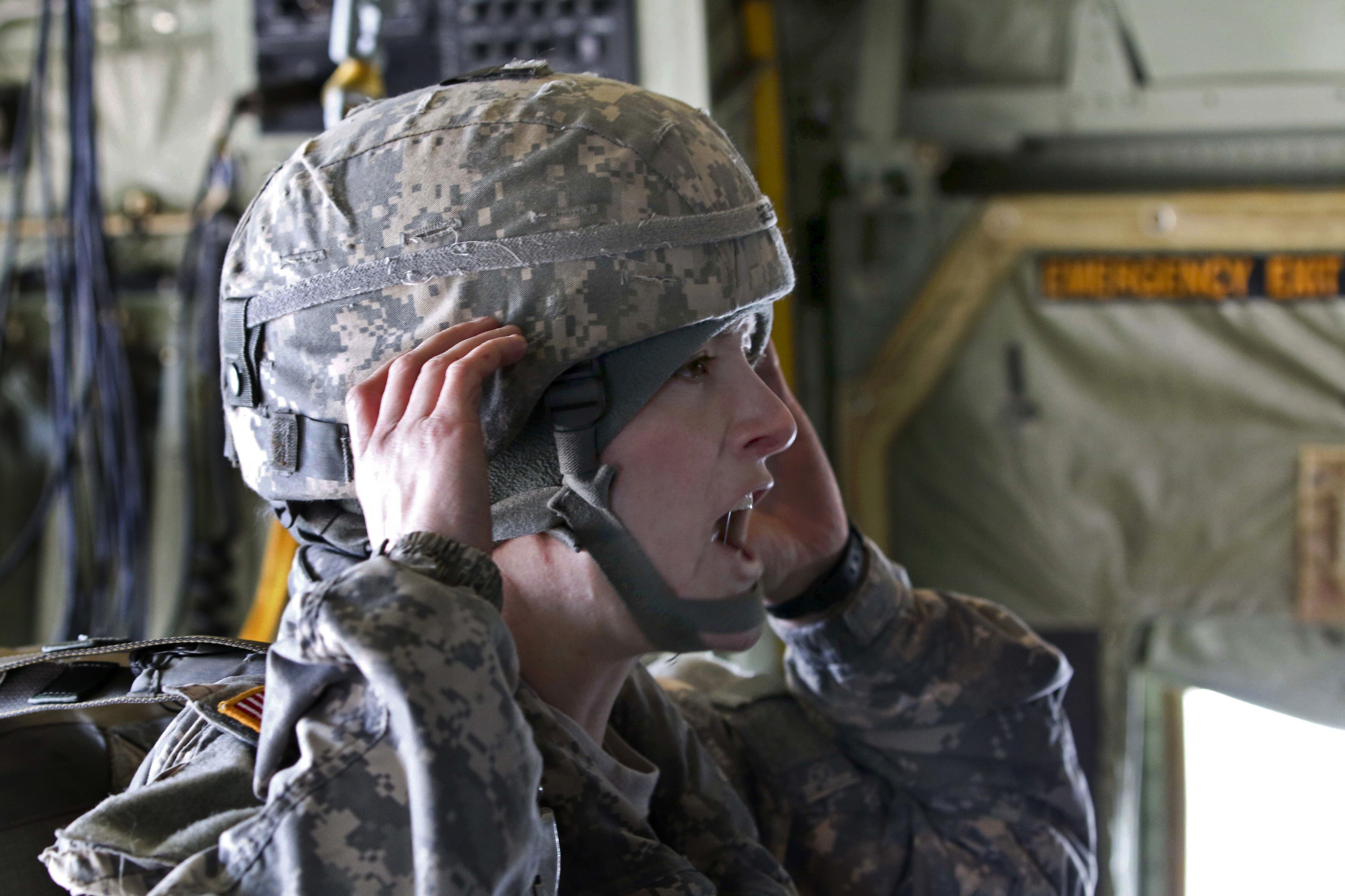 Army Staff Sgt. Michelle Gelner gives the command to hook up to the ...