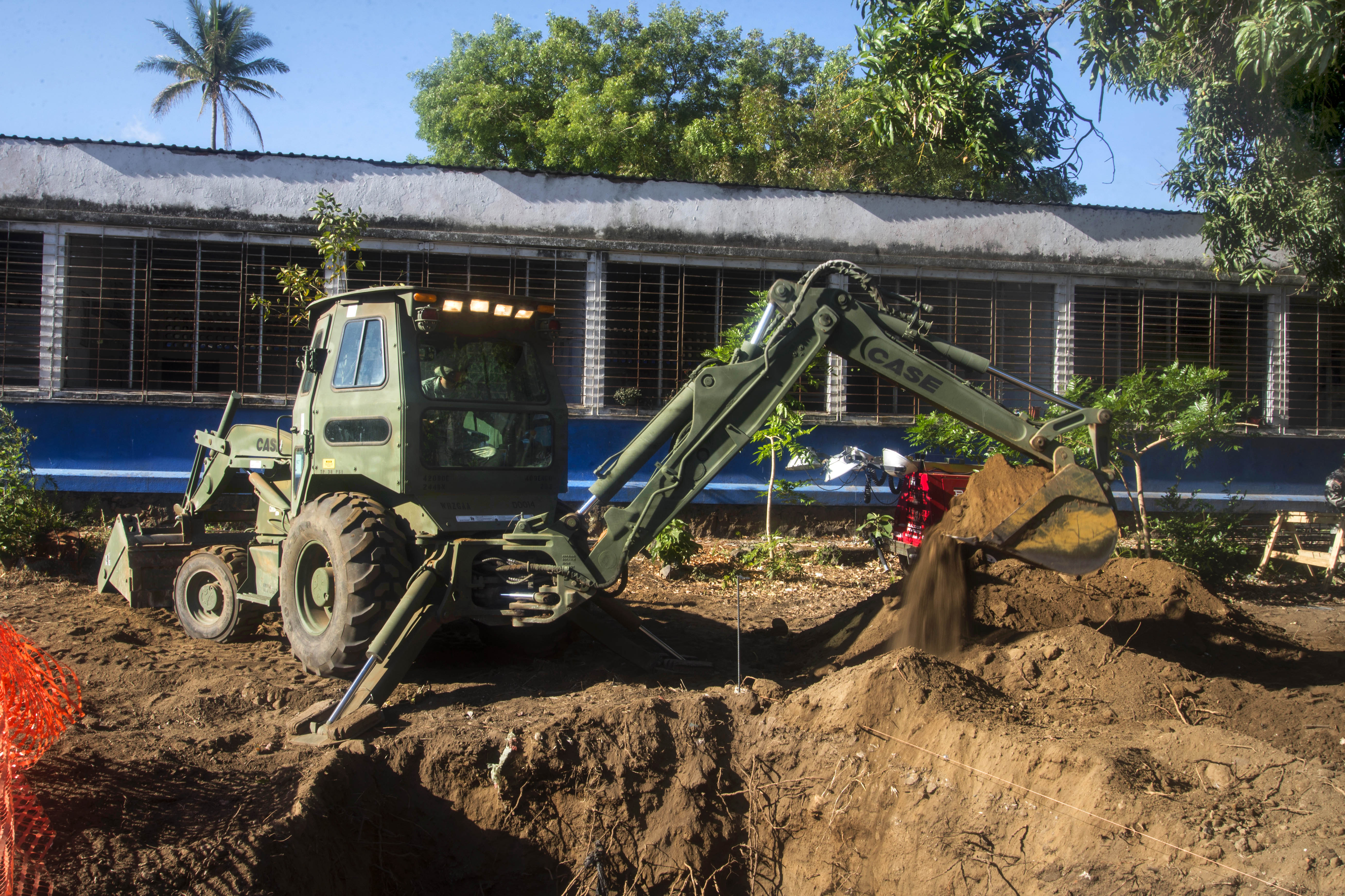 U.S. Army Spc. Michael Boyce digs a pit during Beyond the Horizon 2015 ...