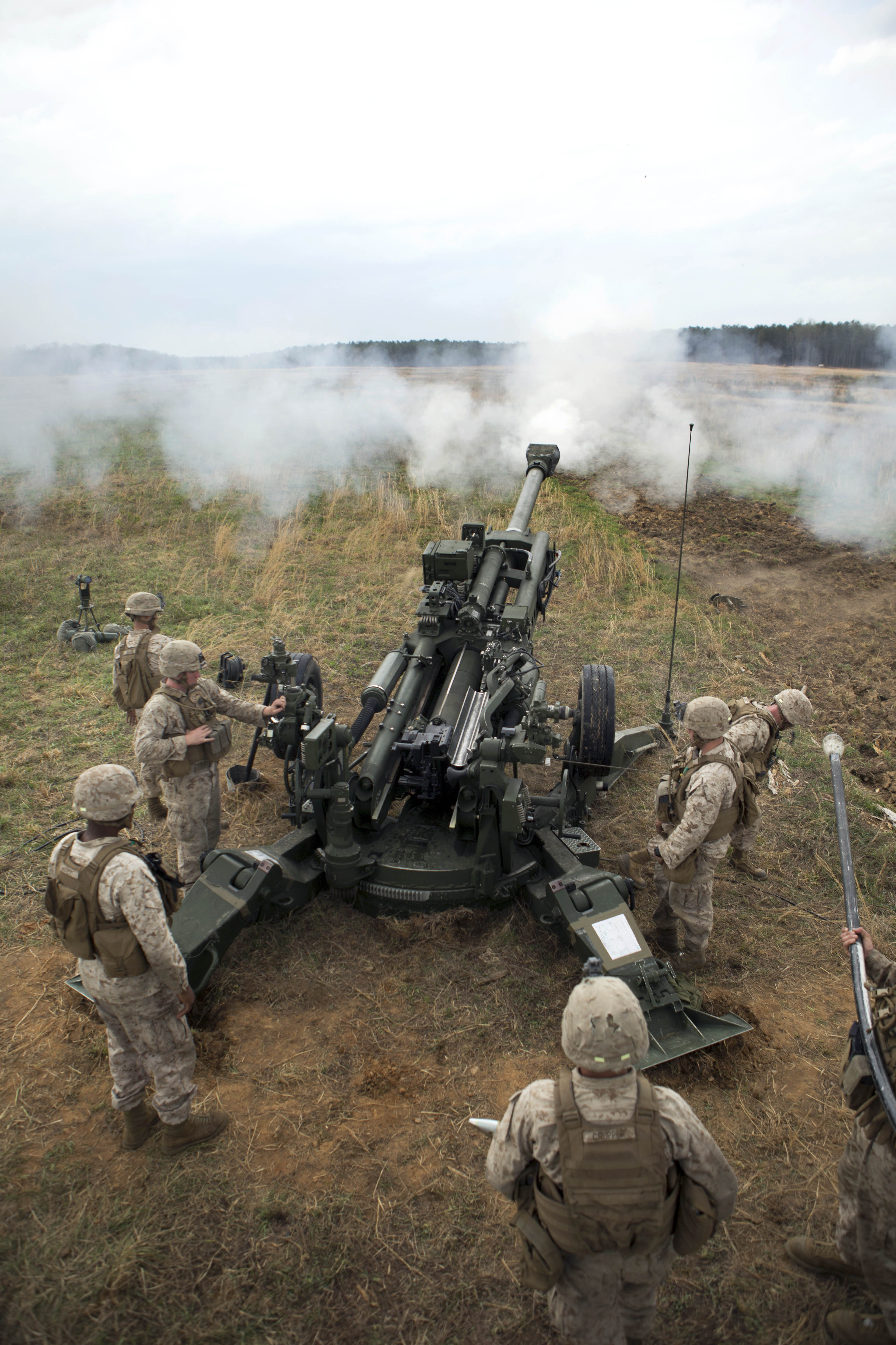 Marines fire an M777A2 Medium Towed Howitzer during a live-fire ...