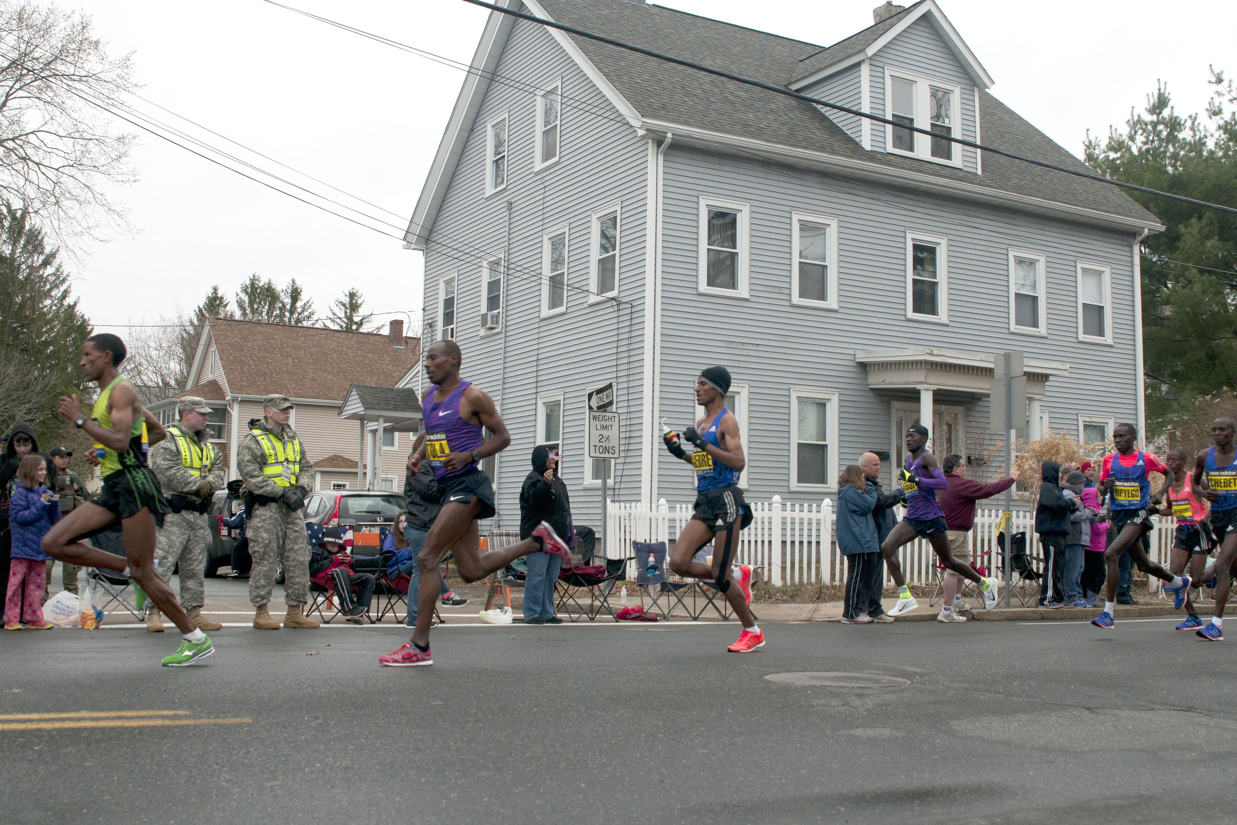 Army military policemen provide security while watching runners ...