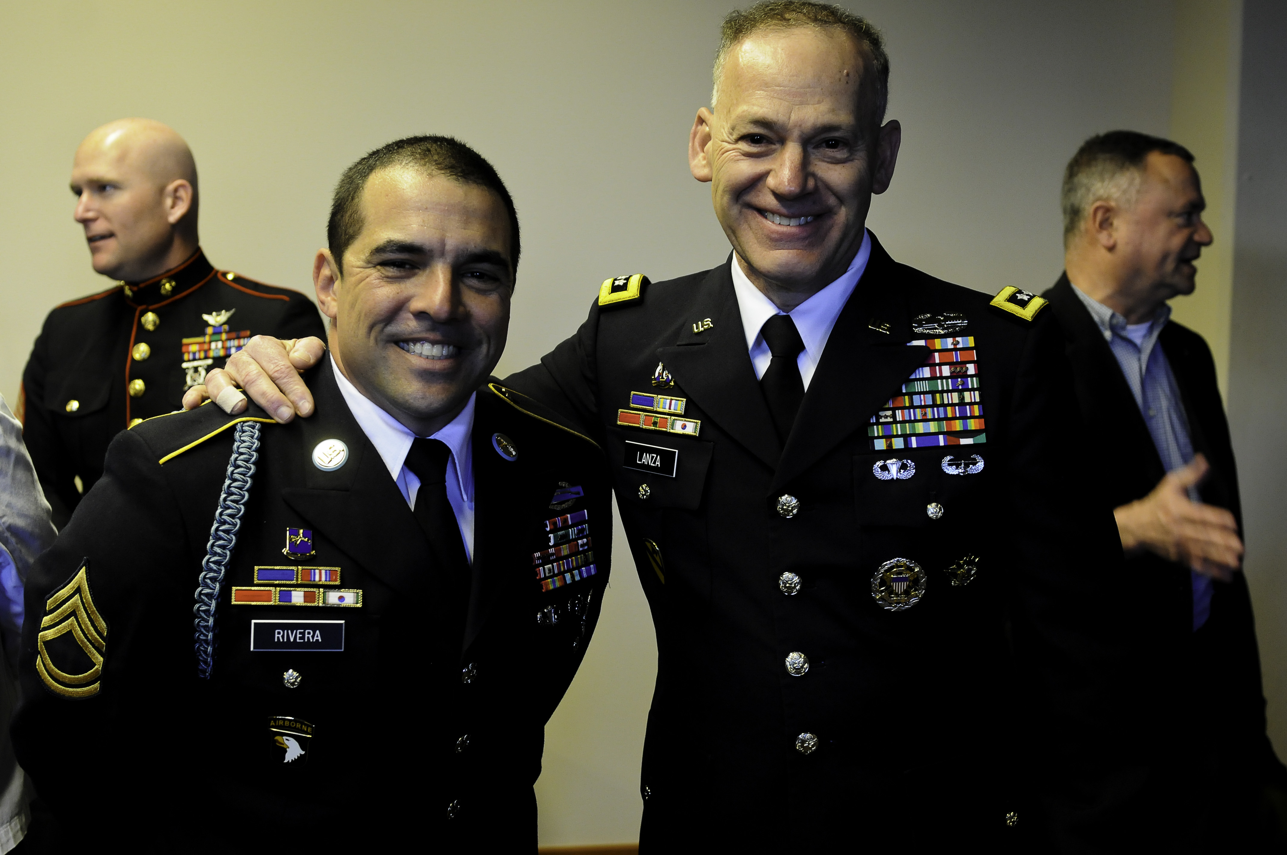 Army Lt. Gen. Stephen Lanza, right, I Corps commanding general, greets Army Sgt. 1st Class Jose ...
