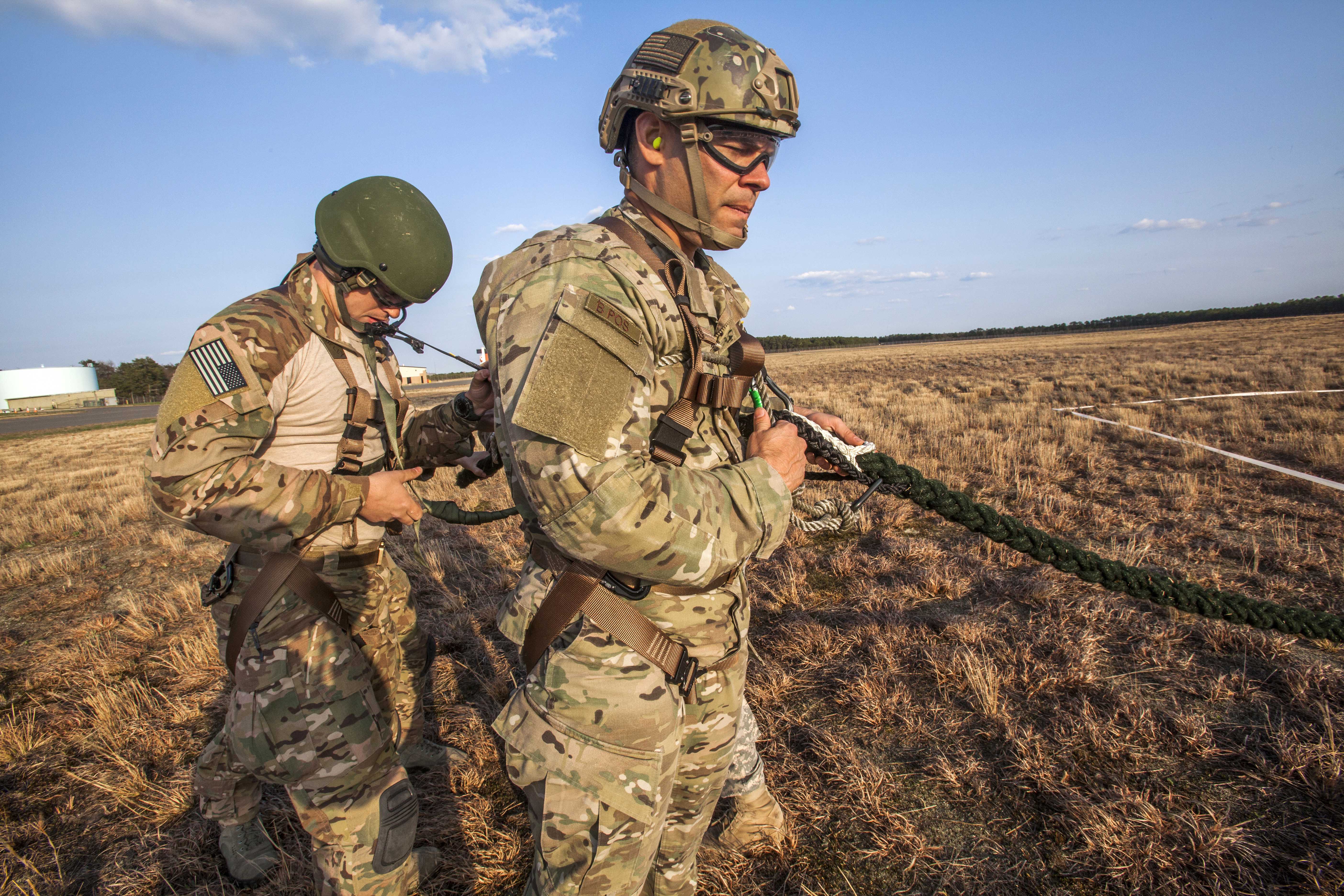 Airmen hook up to a fast-rope insertion and extraction system for ...
