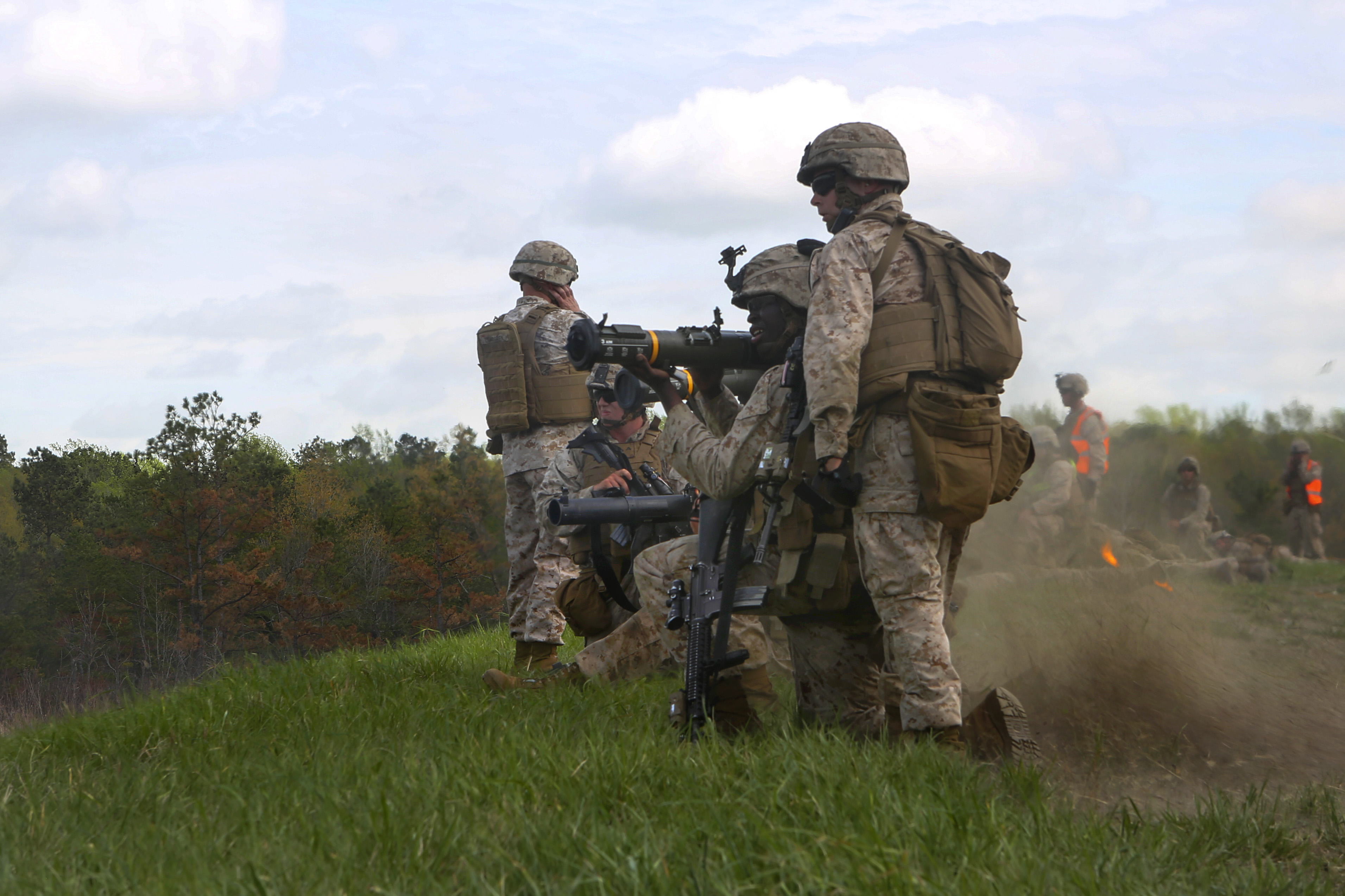 A Marine fires an M136 AT4 light anti-tank weapon during an infantry ...