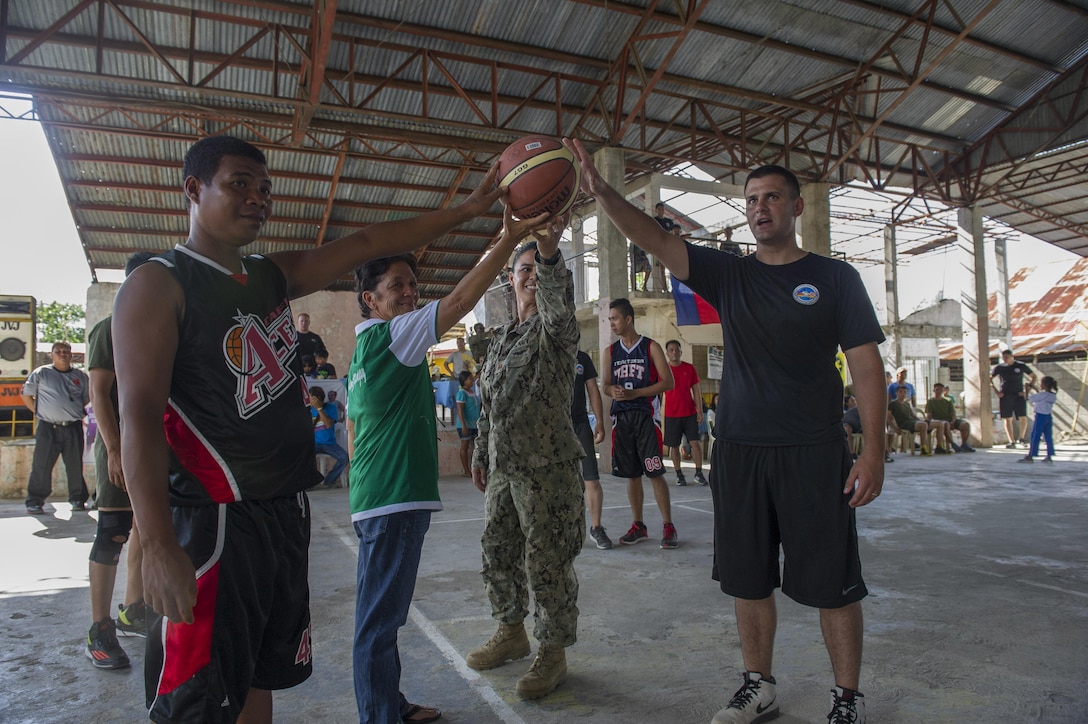 Panay CJCMOTF plays basketball in Taft Barangay during Balikatan