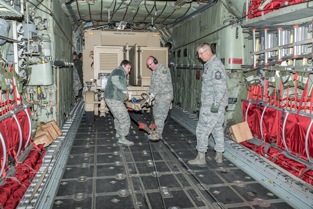 Airmen load TRN-48 TACAN for upcoming training