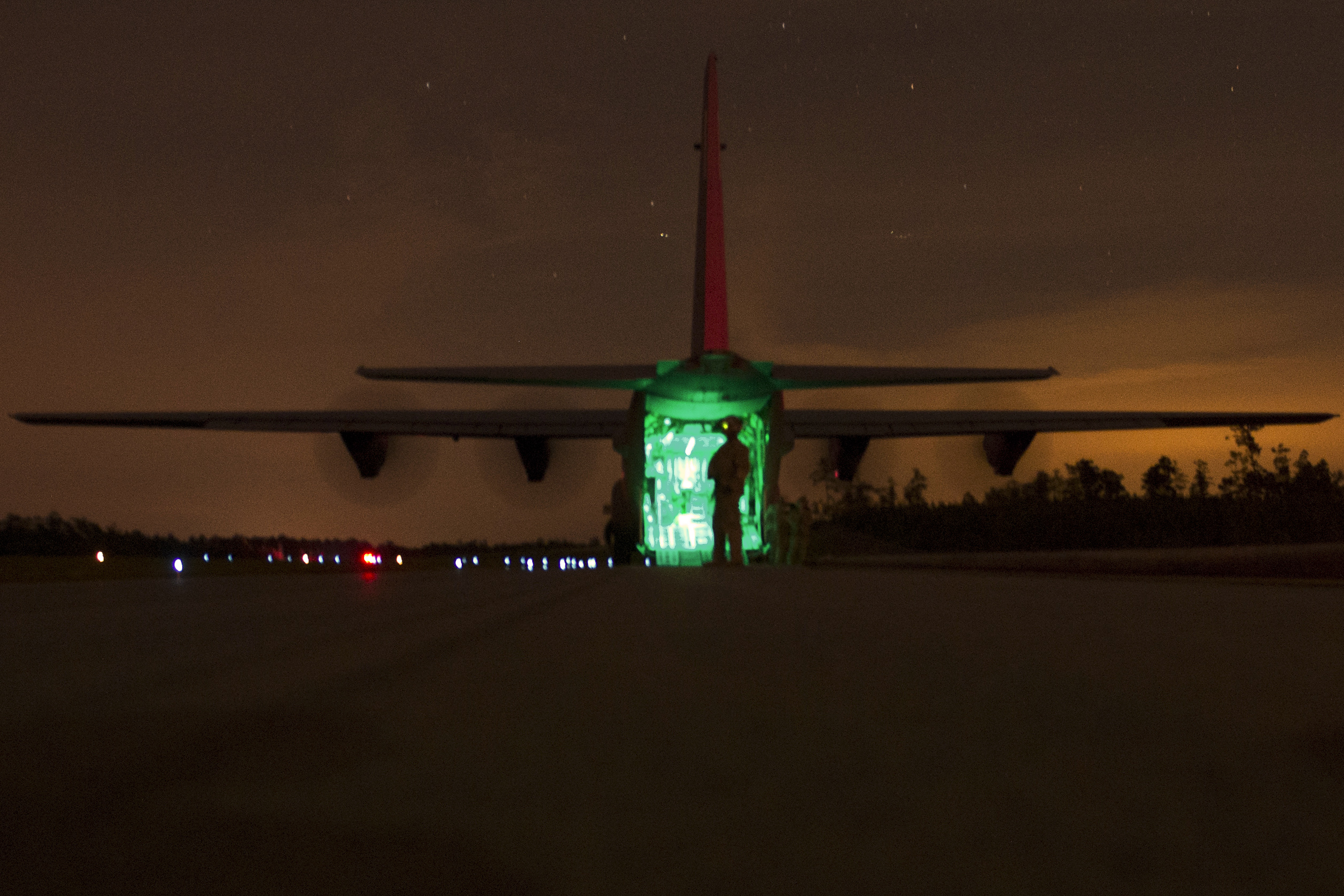 A U.S. Air Force C-130 Hercules prepares to taxi at Elizabeth drop zone ...