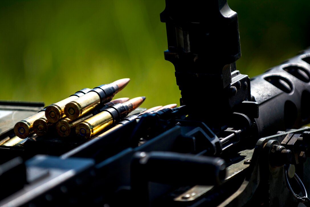 Army reserve soldiers fire a M2 Browning .50-caliber machine gun as ...