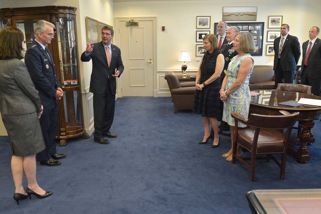 Defense Secretary Ash Carter, center, makes a few comments as he hosts ...