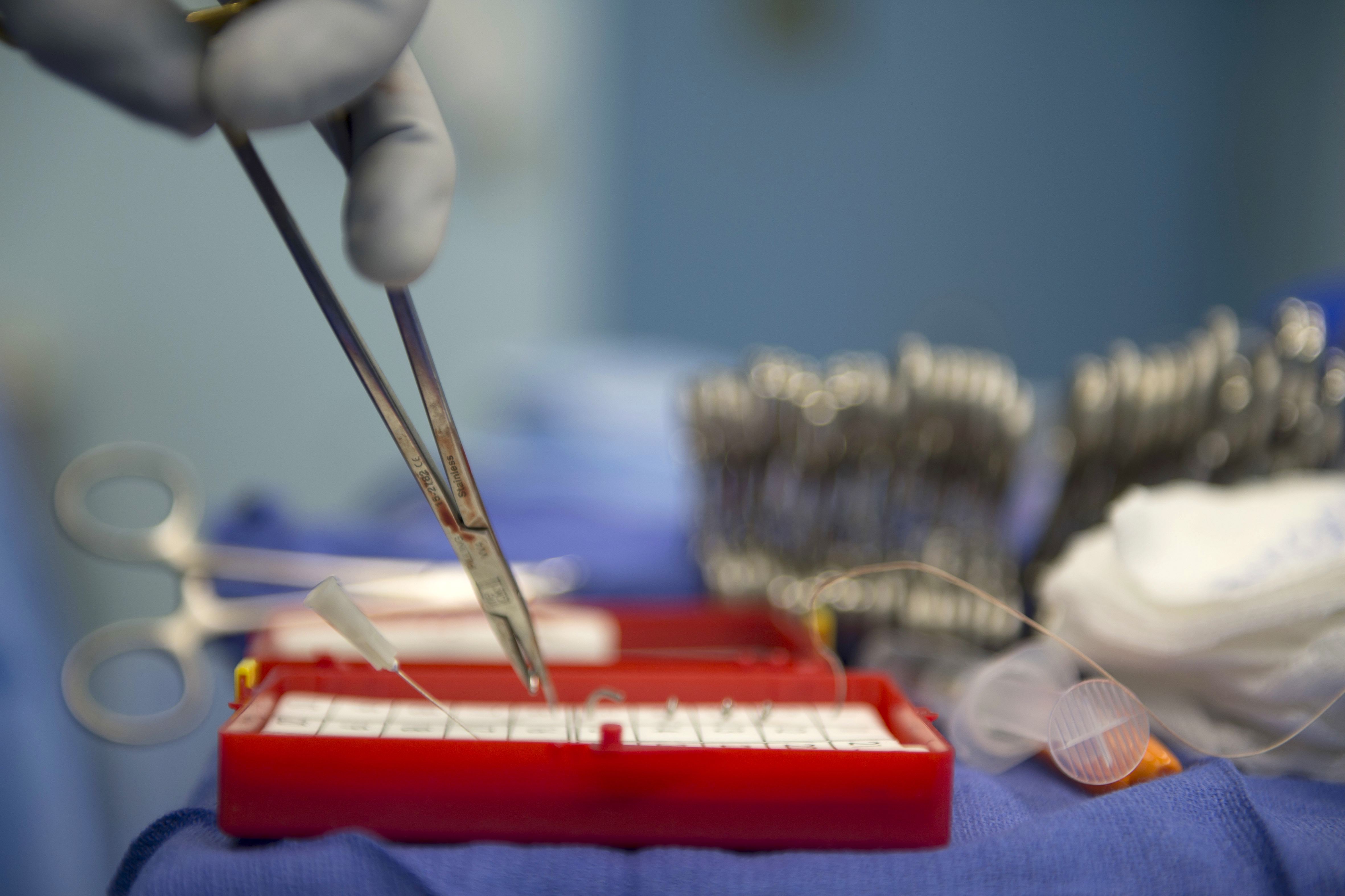 U.S. Navy Petty Officer 3rd Class Andrew Kim, not shown, manages ...