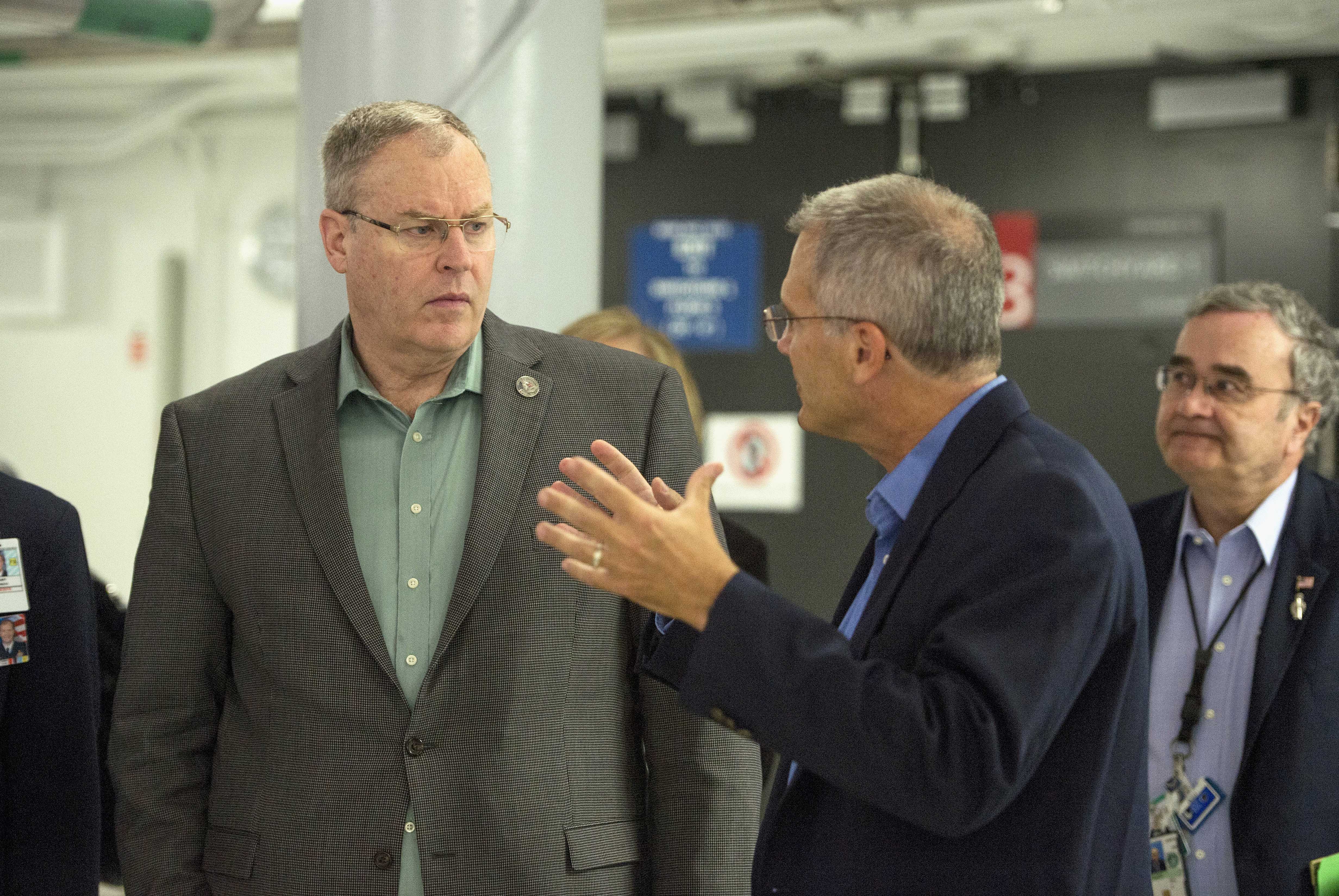 Deputy Defense Secretary Bob Work is briefed on the function and ...