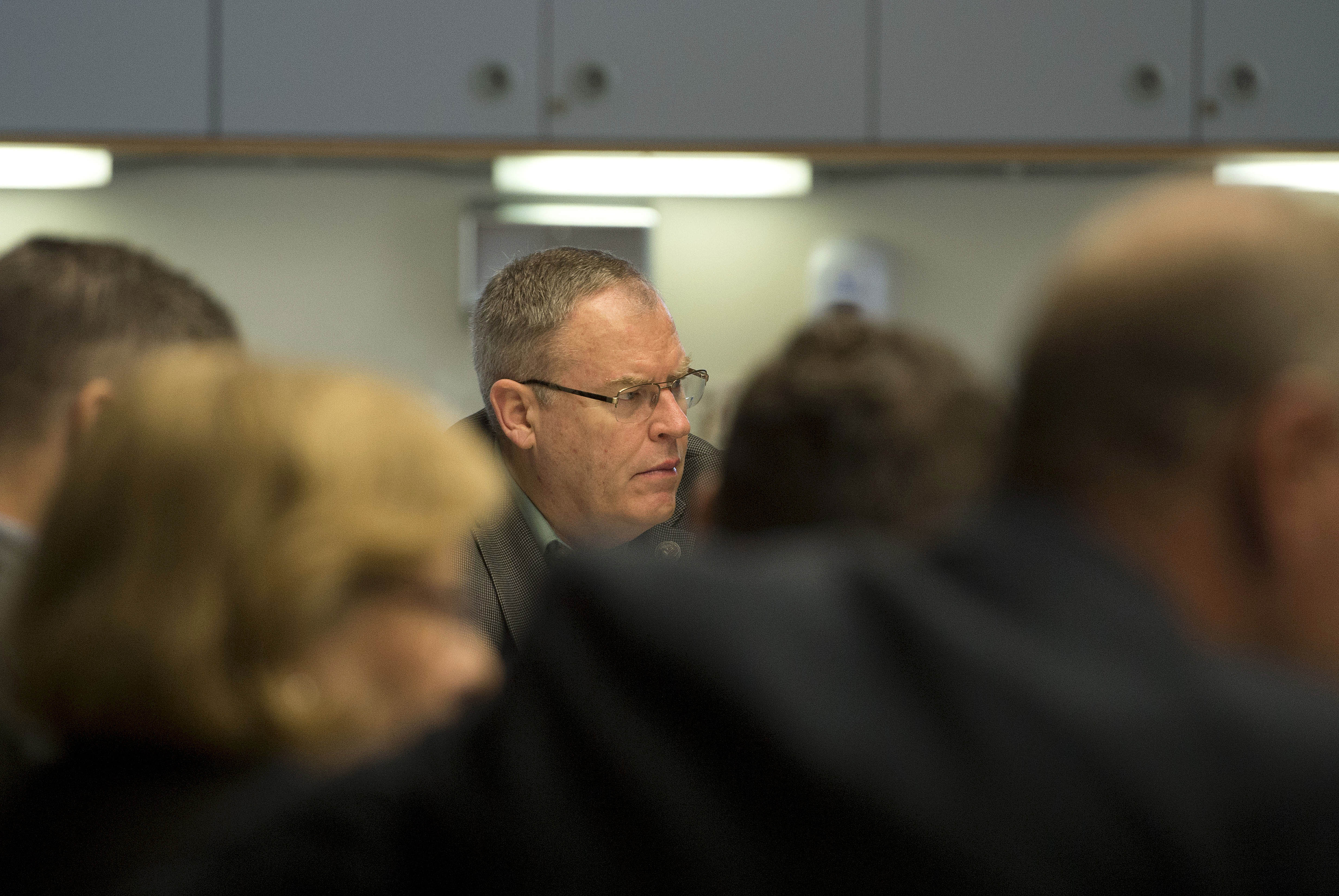 Deputy Defense Secretary Bob Work talks with members of the Lawrence ...