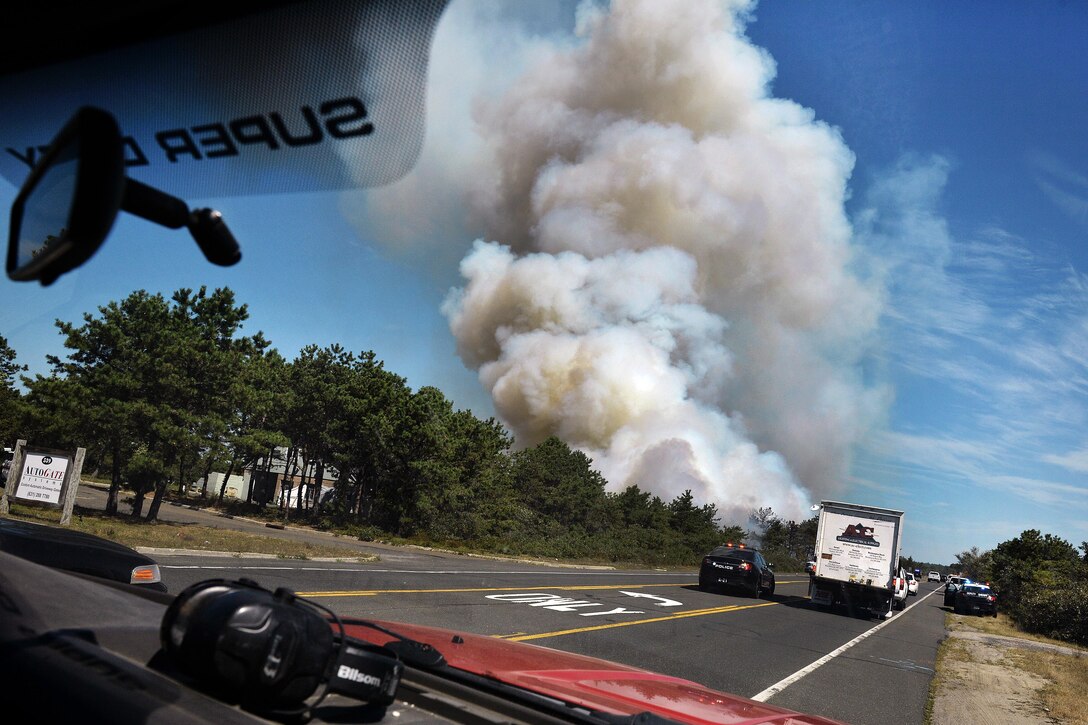 Airmen and Westhampton Fire Department responders head to a major brush ...