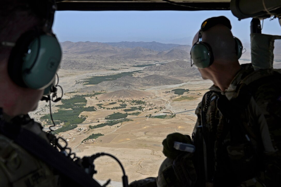 Australian army Col. Richard Mallet, right, deputy chief of staff for ...