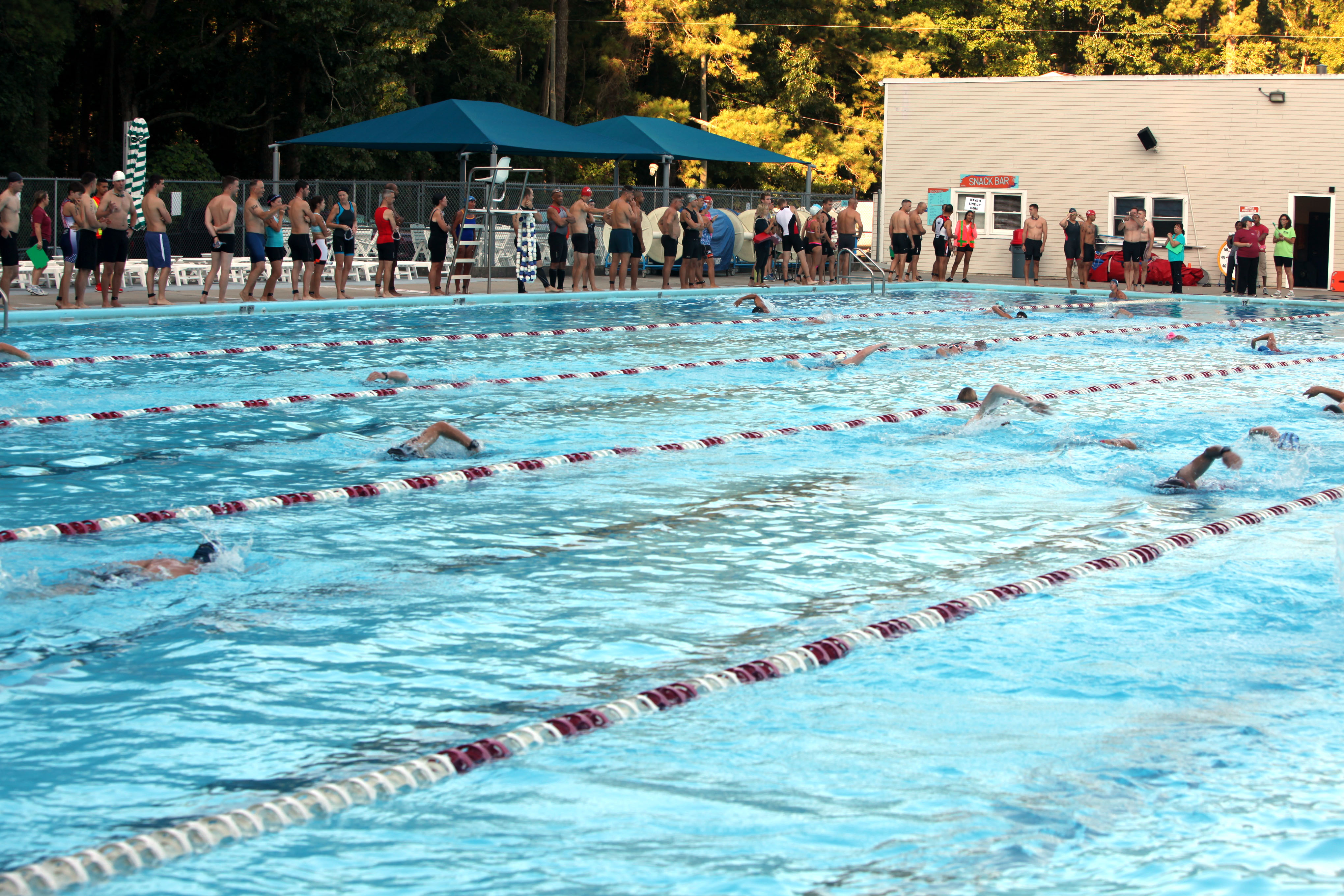 Kids, adults, swim, bike, run in MCCS Triathlon