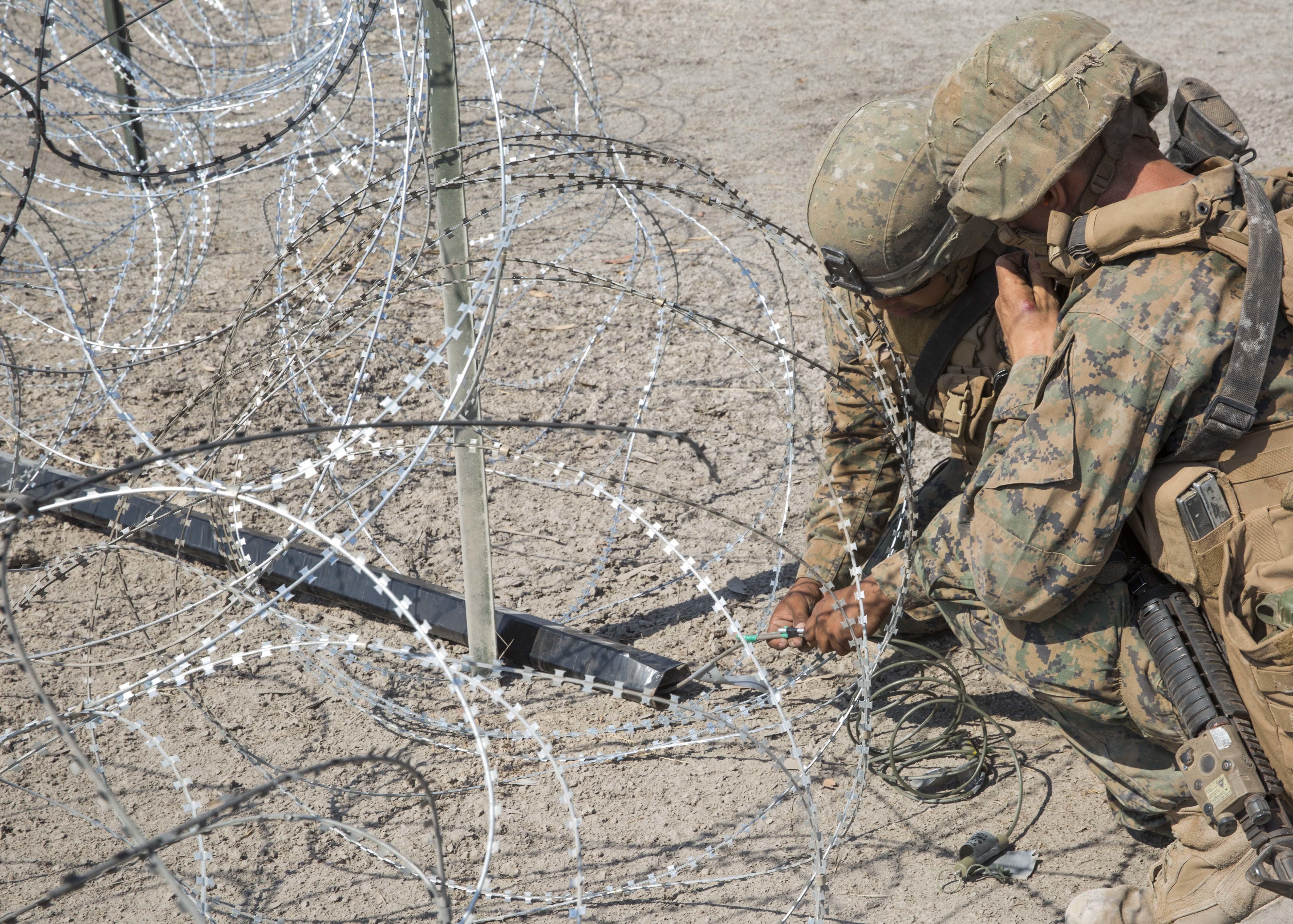 U.S. Marine Corps combat engineers conduct demolition training during ...