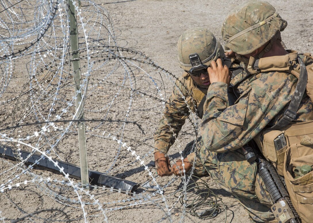 U.S. Marine Corps combat engineers conduct demolition training during ...