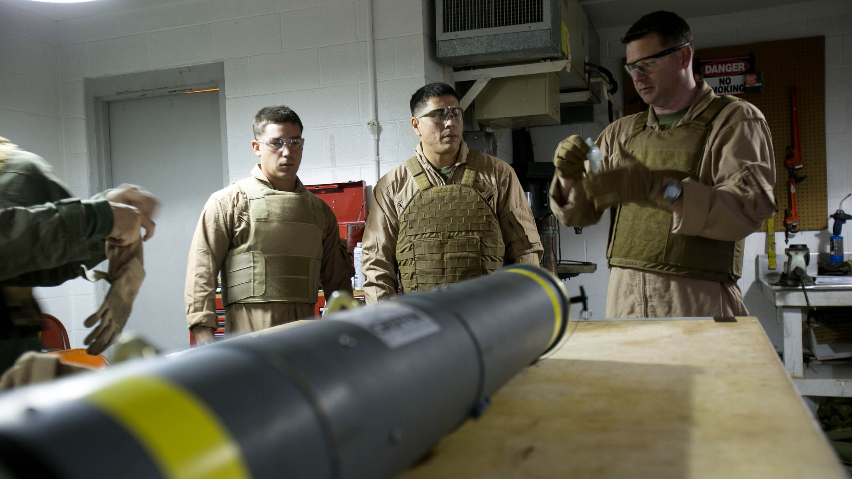 Steady hands: EOD technicians disarm Griffin missile