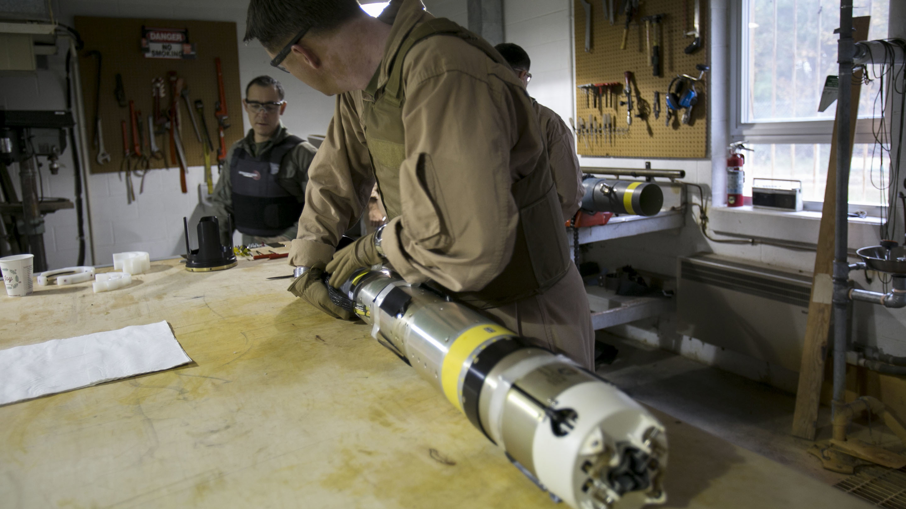Steady hands: EOD technicians disarm Griffin missile