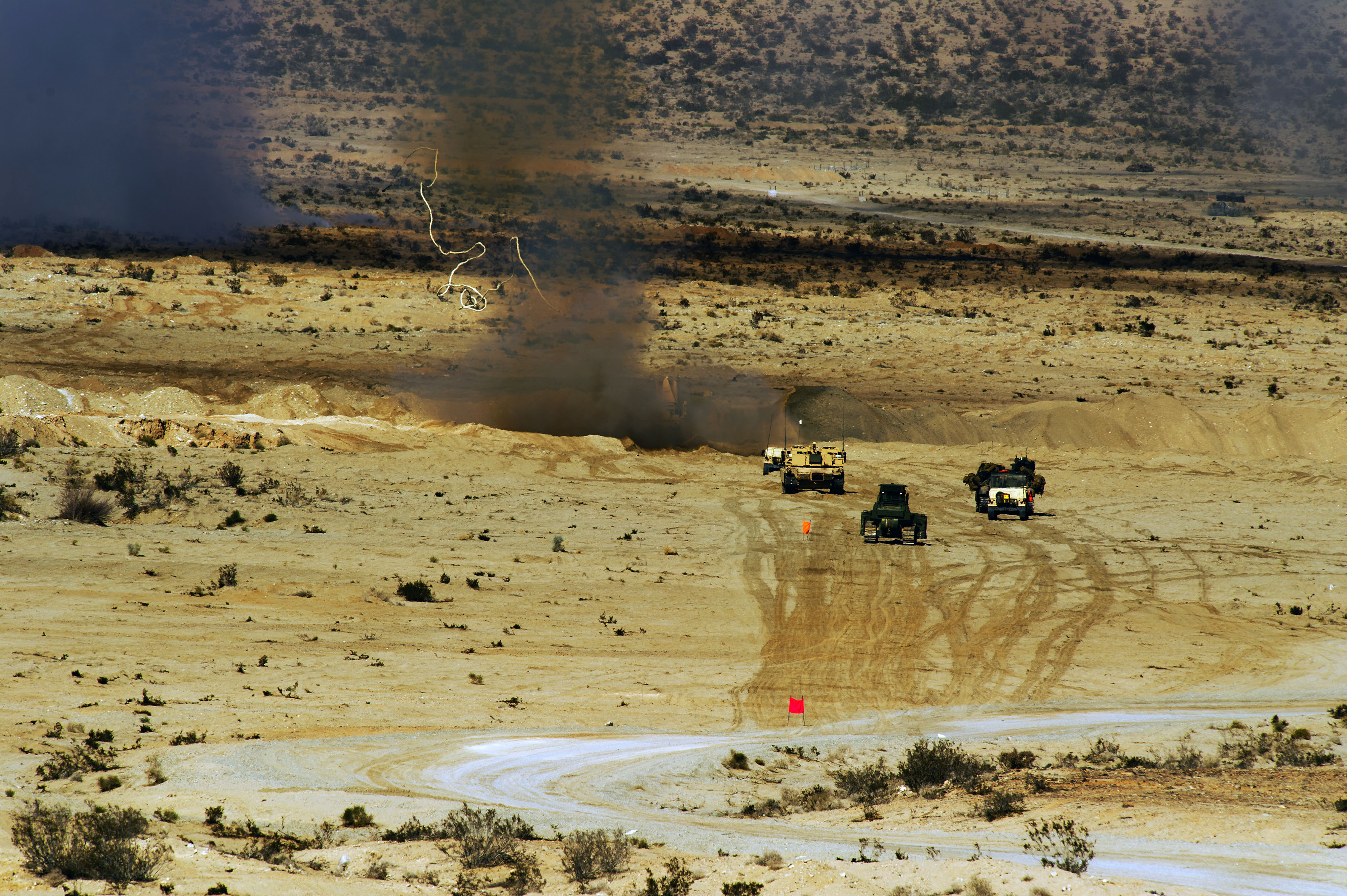 Marines deploy an M58 mine clearing line charge while participating in ...