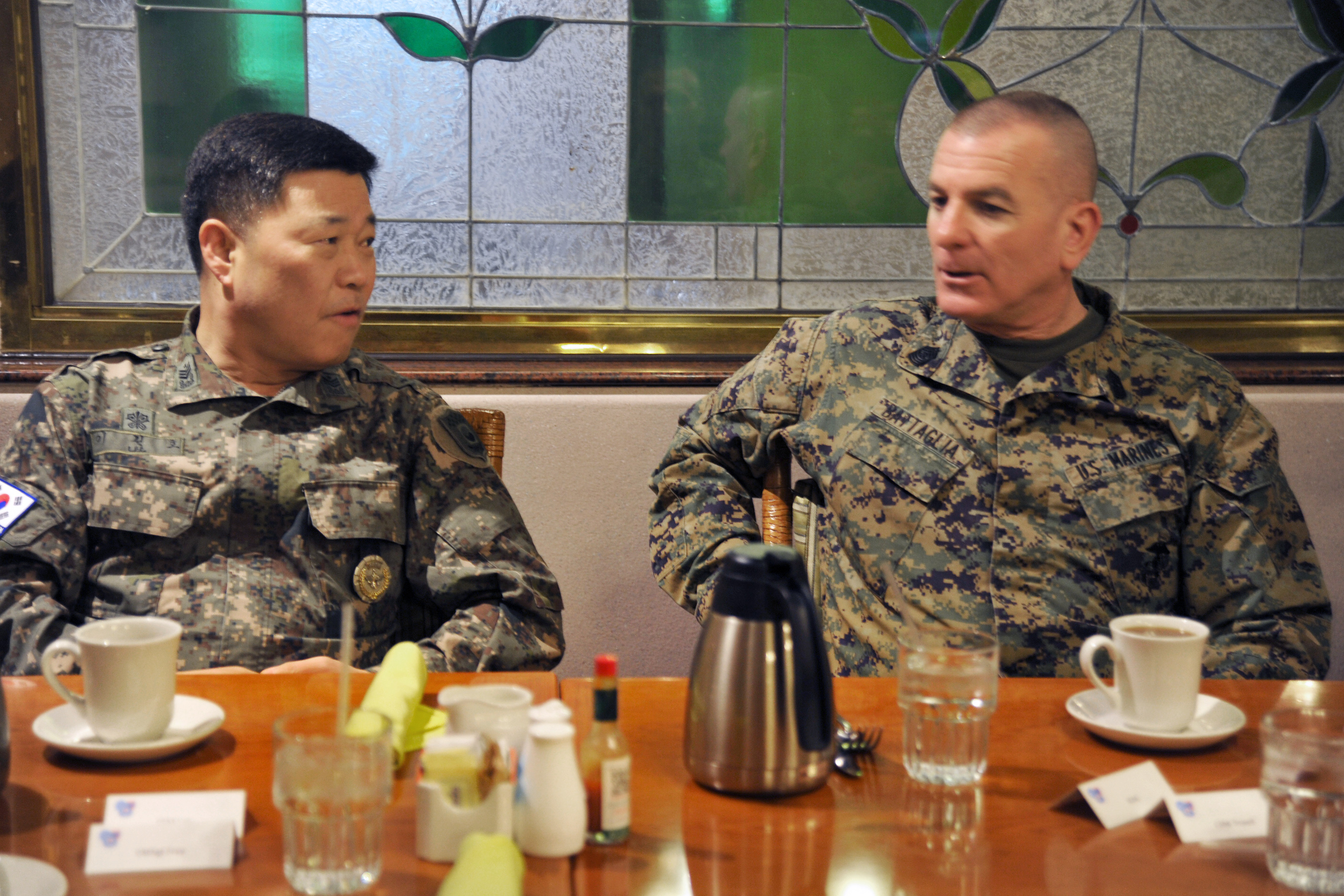 U.S. Marine Corps Sgt. Maj. Bryan Battaglia, right, senior enlisted ...