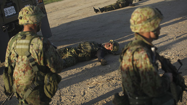 Japanese forces practice amphibious raids along the coast of southern ...