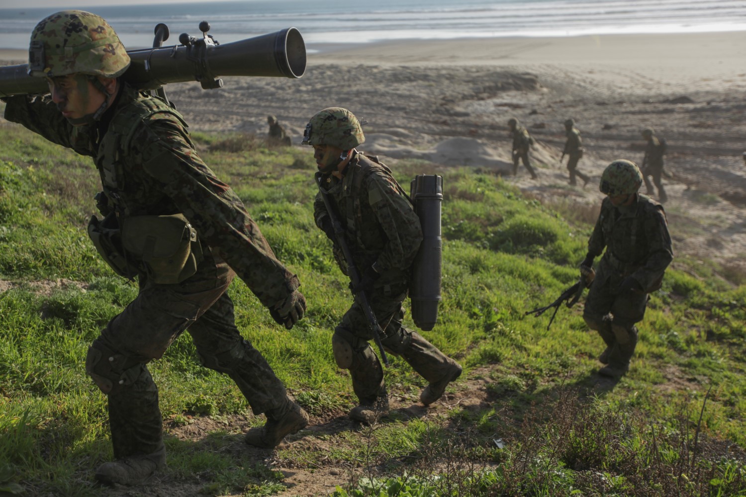 Japanese forces practice amphibious raids along the coast of southern ...