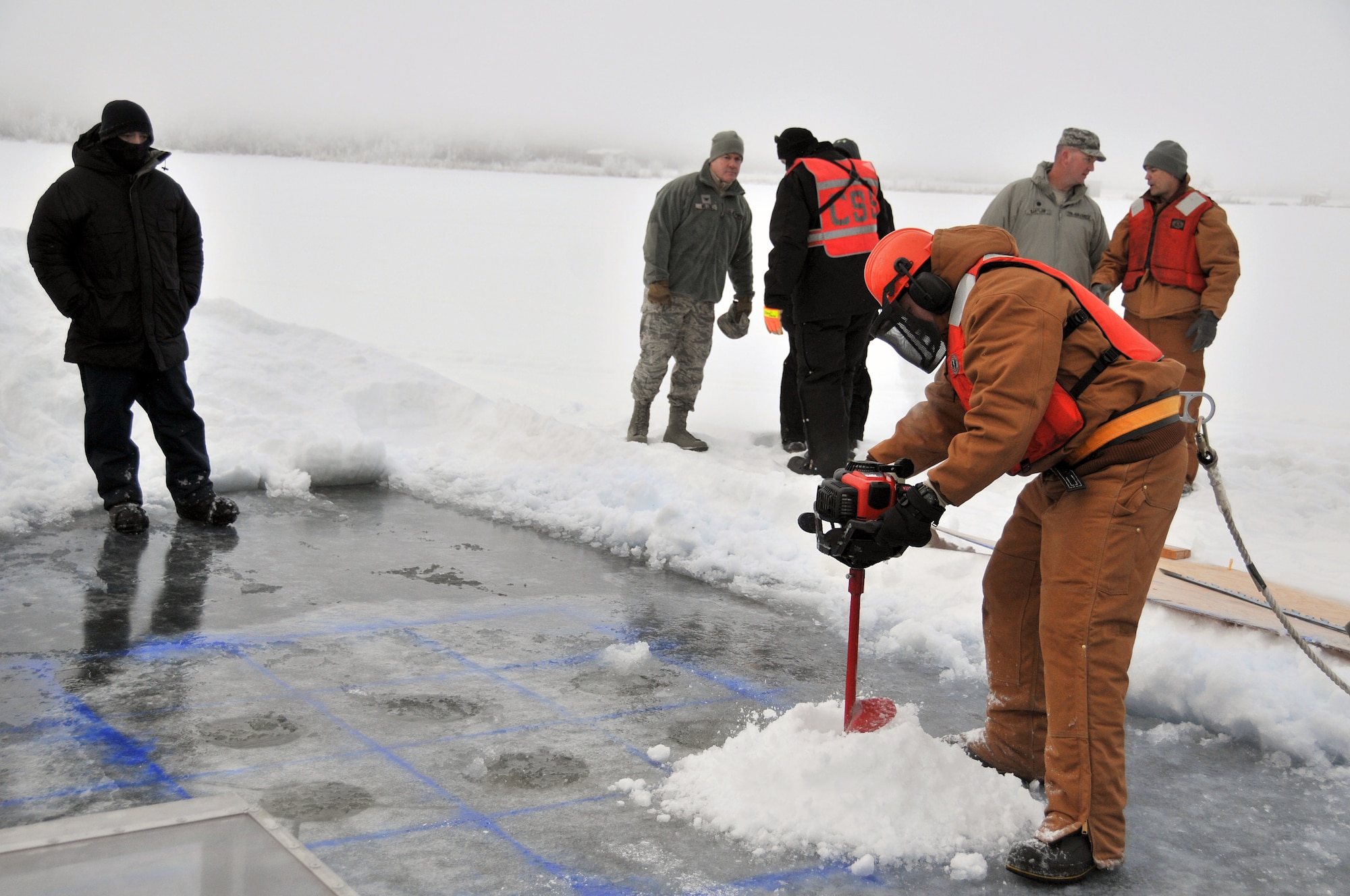 Cleaning hazardous waste under Arctic conditions > Joint Base Elmendorf ...