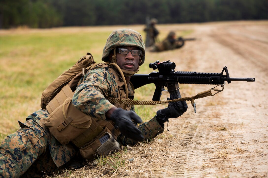 Marine Corps Cpl. Jarrod D. Johnson participates in a simulated combat ...