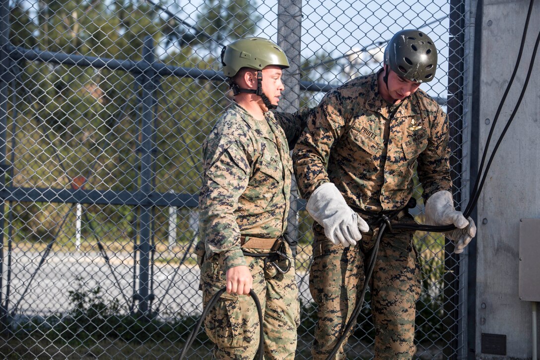 Marines rappel, prepare for combat operations