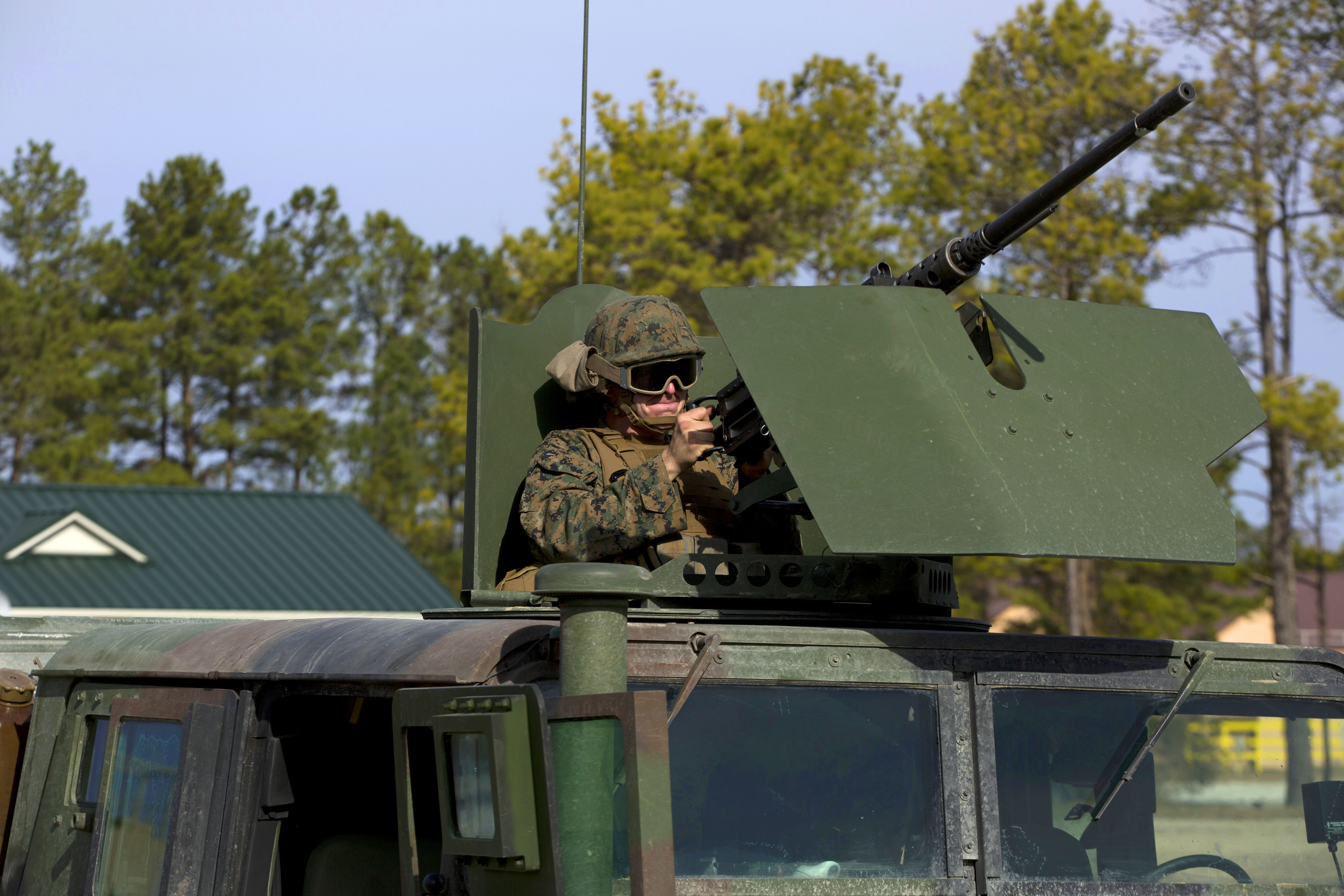 Marine Corps Cpl. Joseph D. Keefe mans a vehicle mounted turret during ...