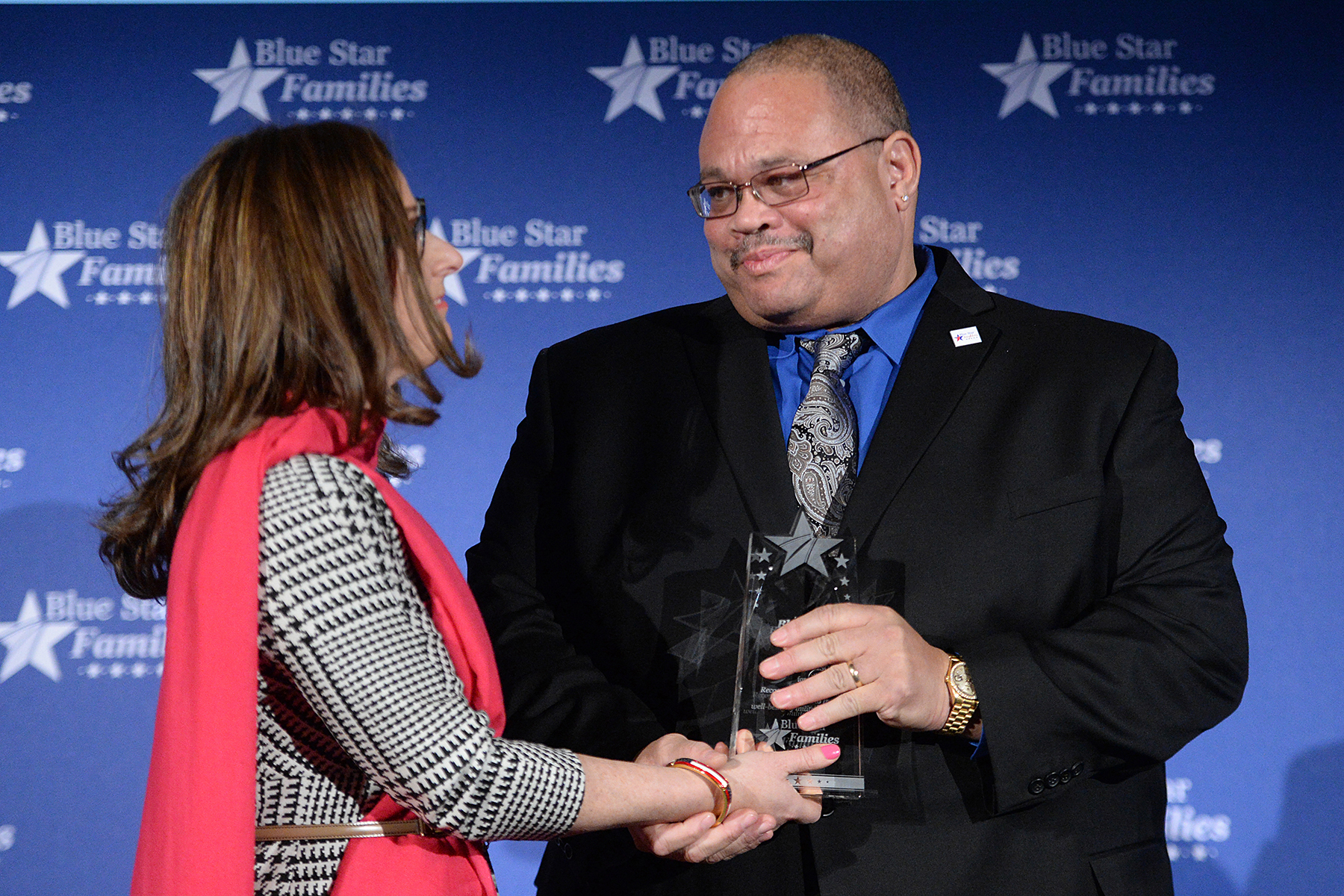 Kathy Roth-Doquet, founder and CEO of Blue Star Families, presents the ...