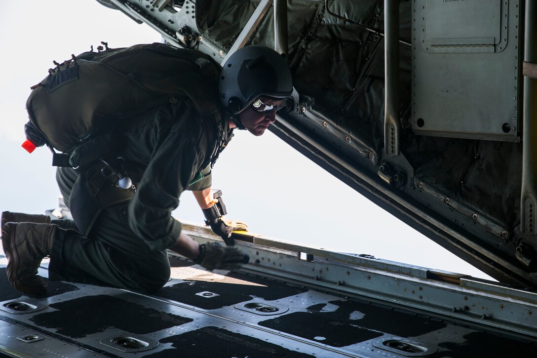 Recon Marines prepare for parachute missions in Pacific