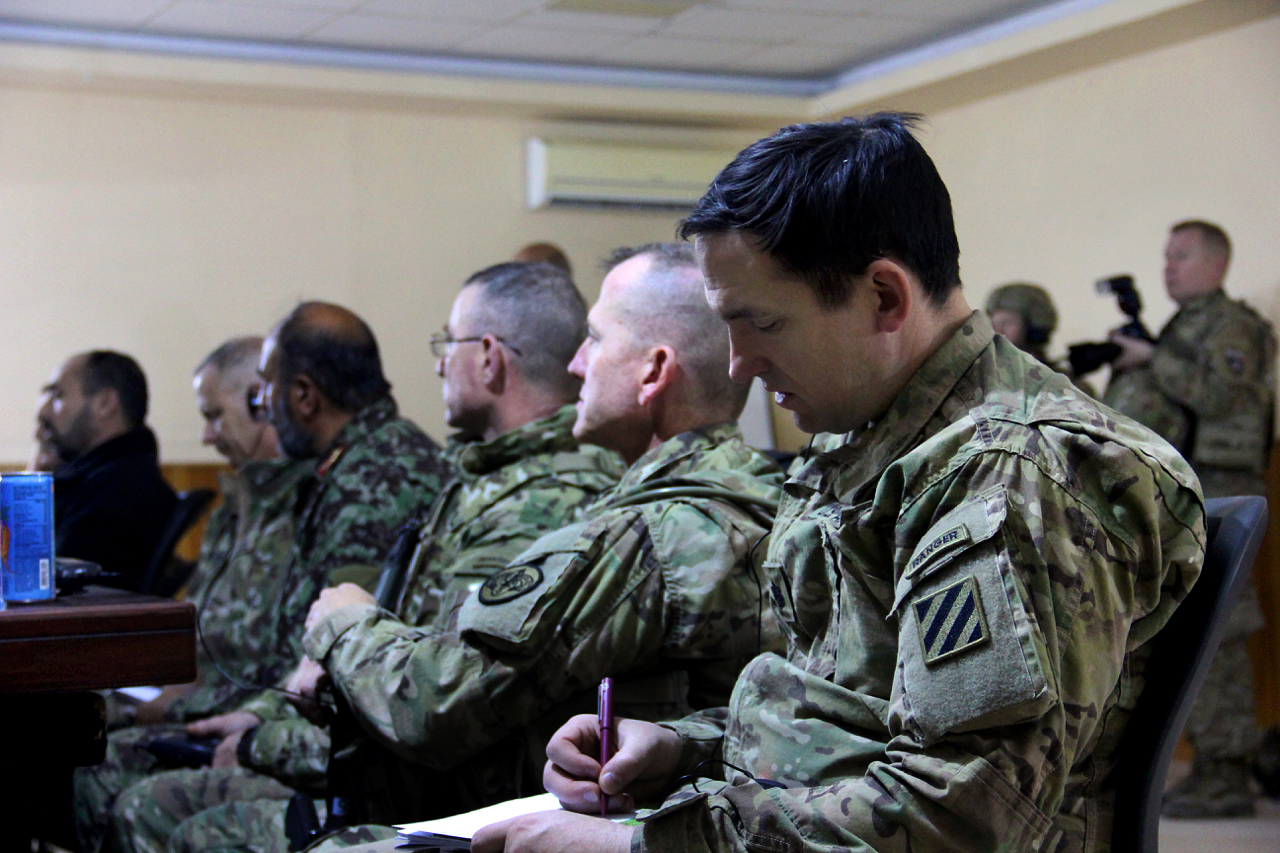 U.S. Army Lt. Col. Pete Fedak, foreground, operations officer for Train ...