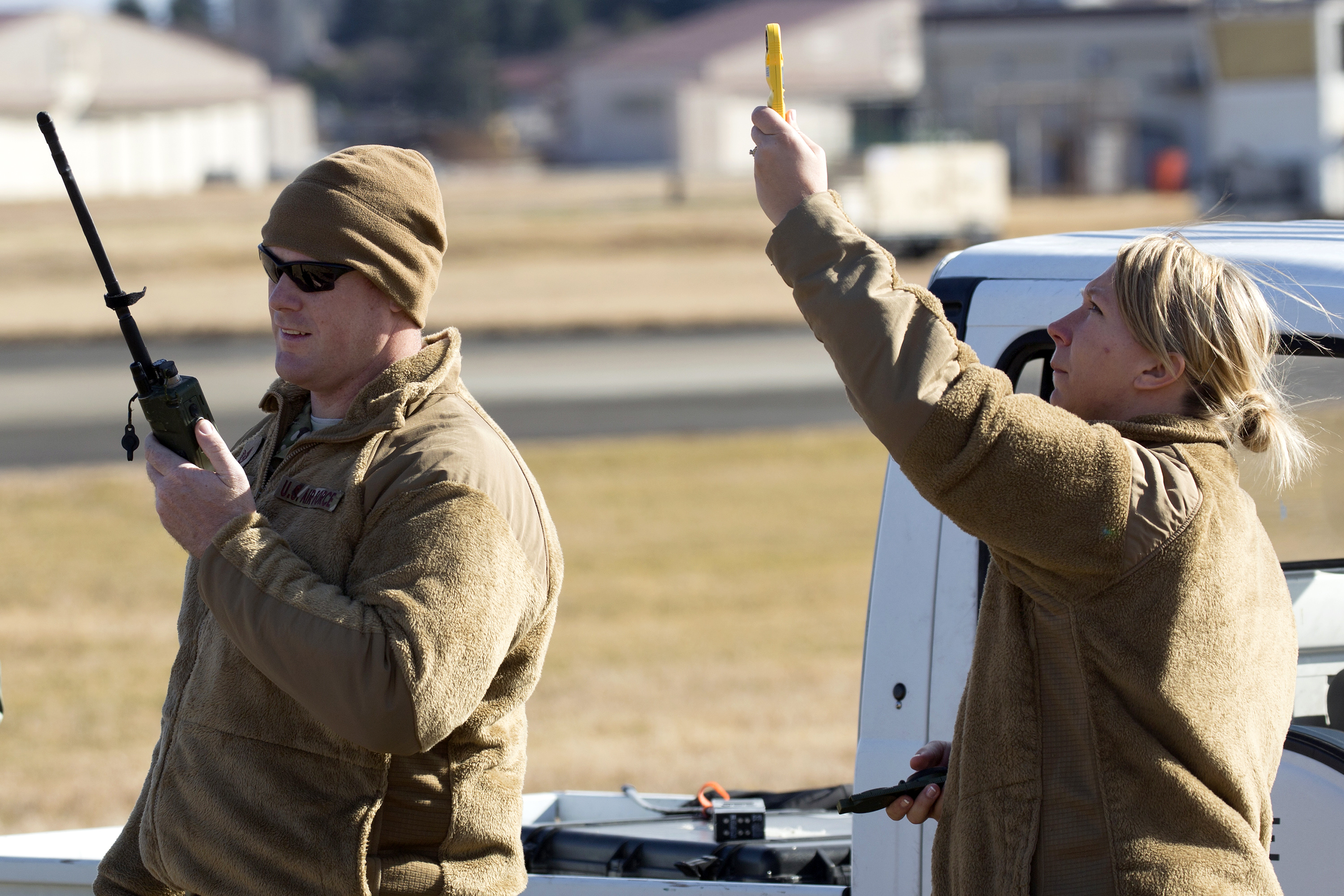 U.S. Air Force Tech. Sgts. Bruce Rick, left, and Kierston Mair check ...