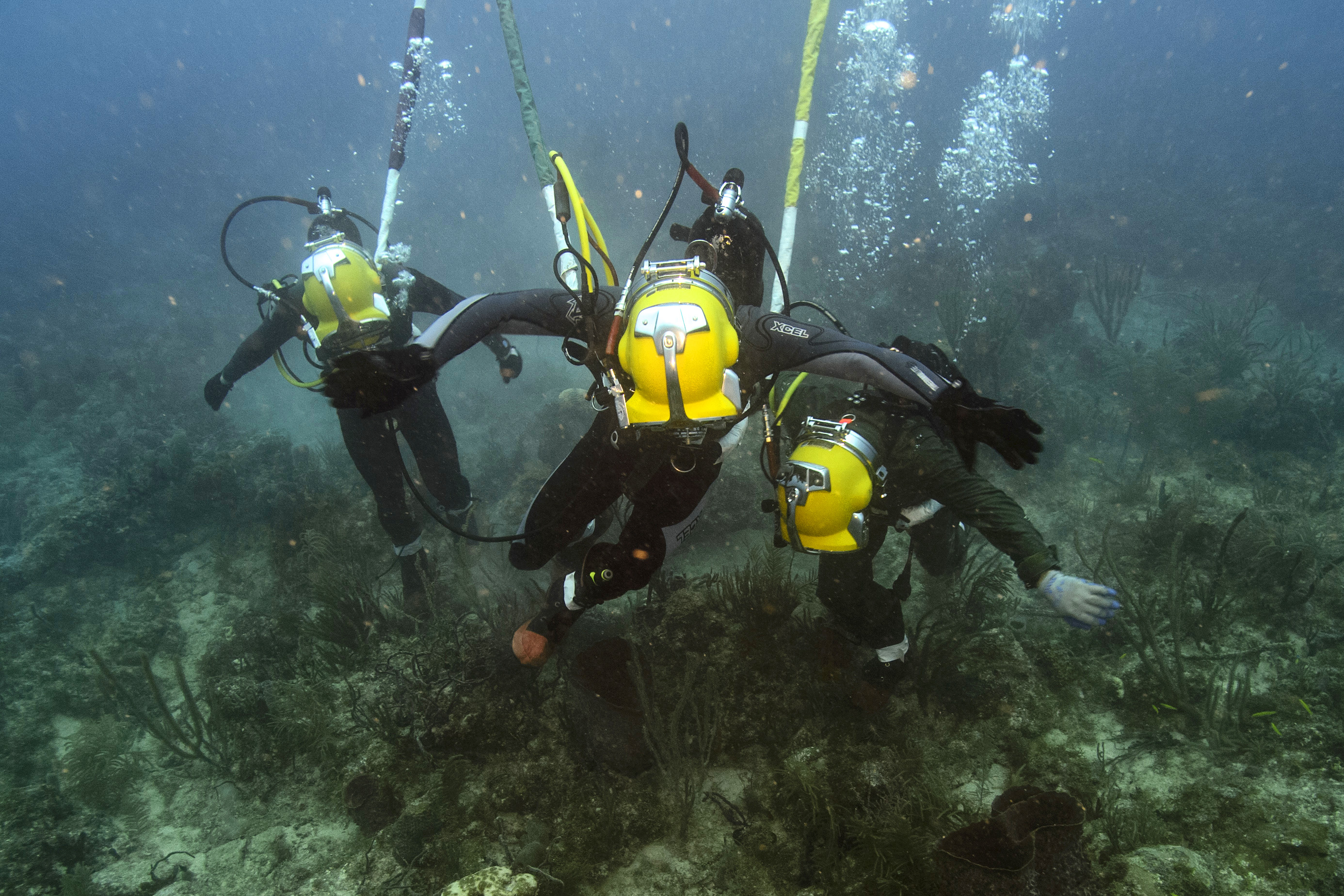 Navy Chief Petty Officer Christopher Munch, right, Navy Petty Officer ...