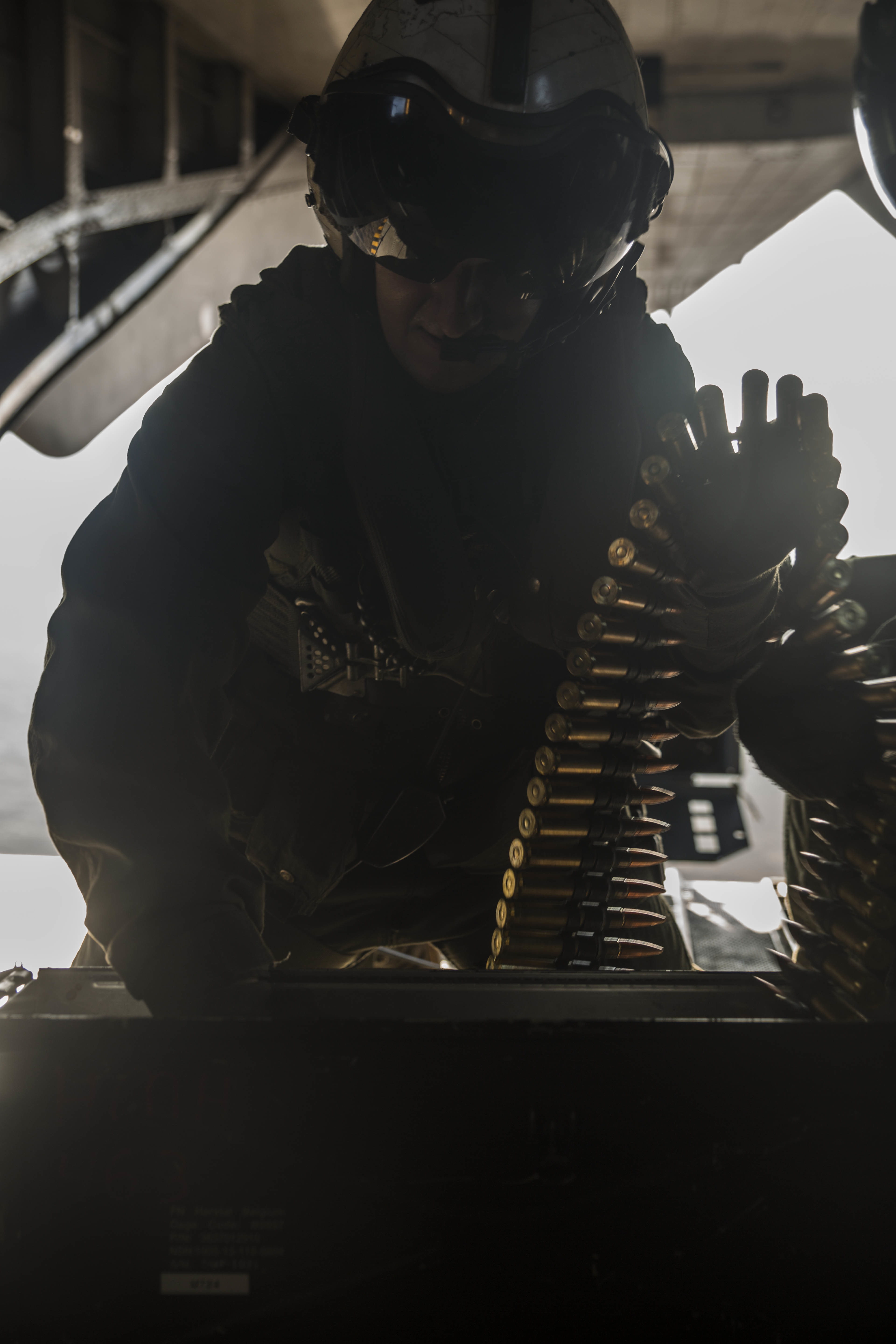 Marines fire machine guns from Super Stallions