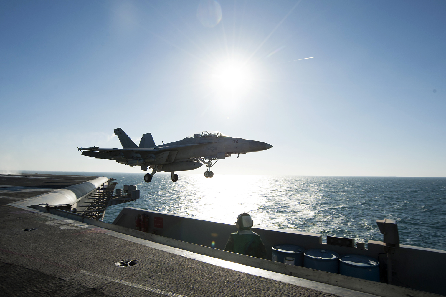 An F/A-18F Super Hornet aircraft from the Strike Fighter Squadron 22 launches from the flight ...