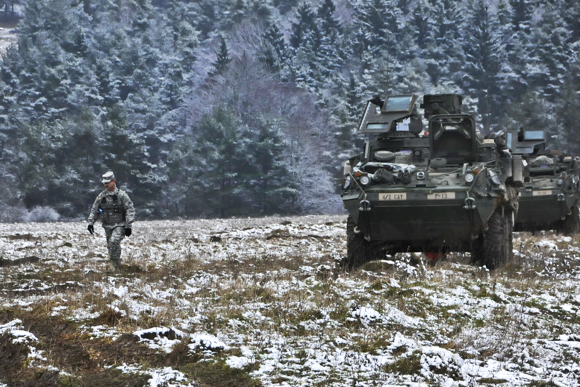 A U.S. soldier leads a convoy to the opposite end of the course after ...