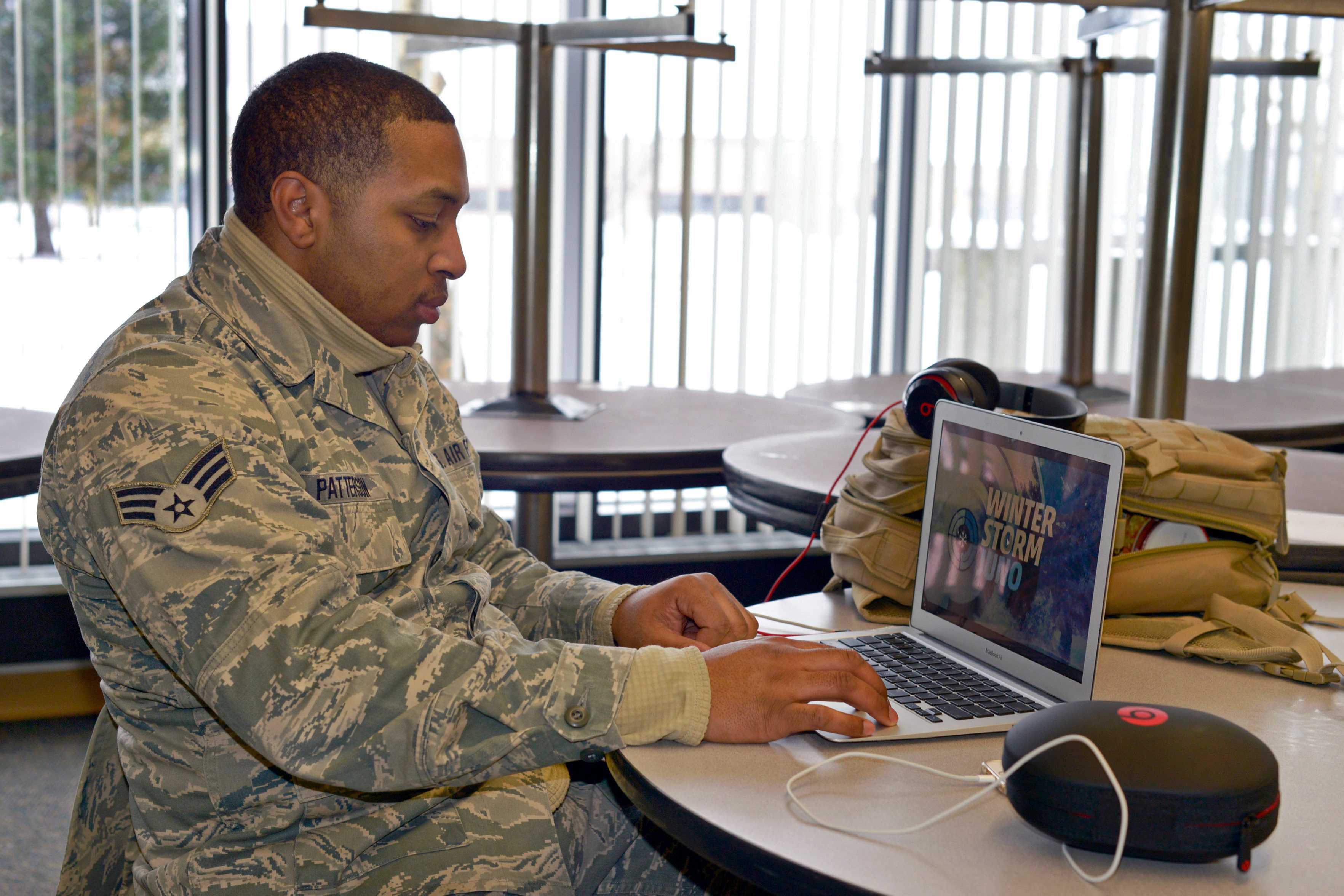 Air National Guard Senior Airman Jordan Patterson checks the weather ...