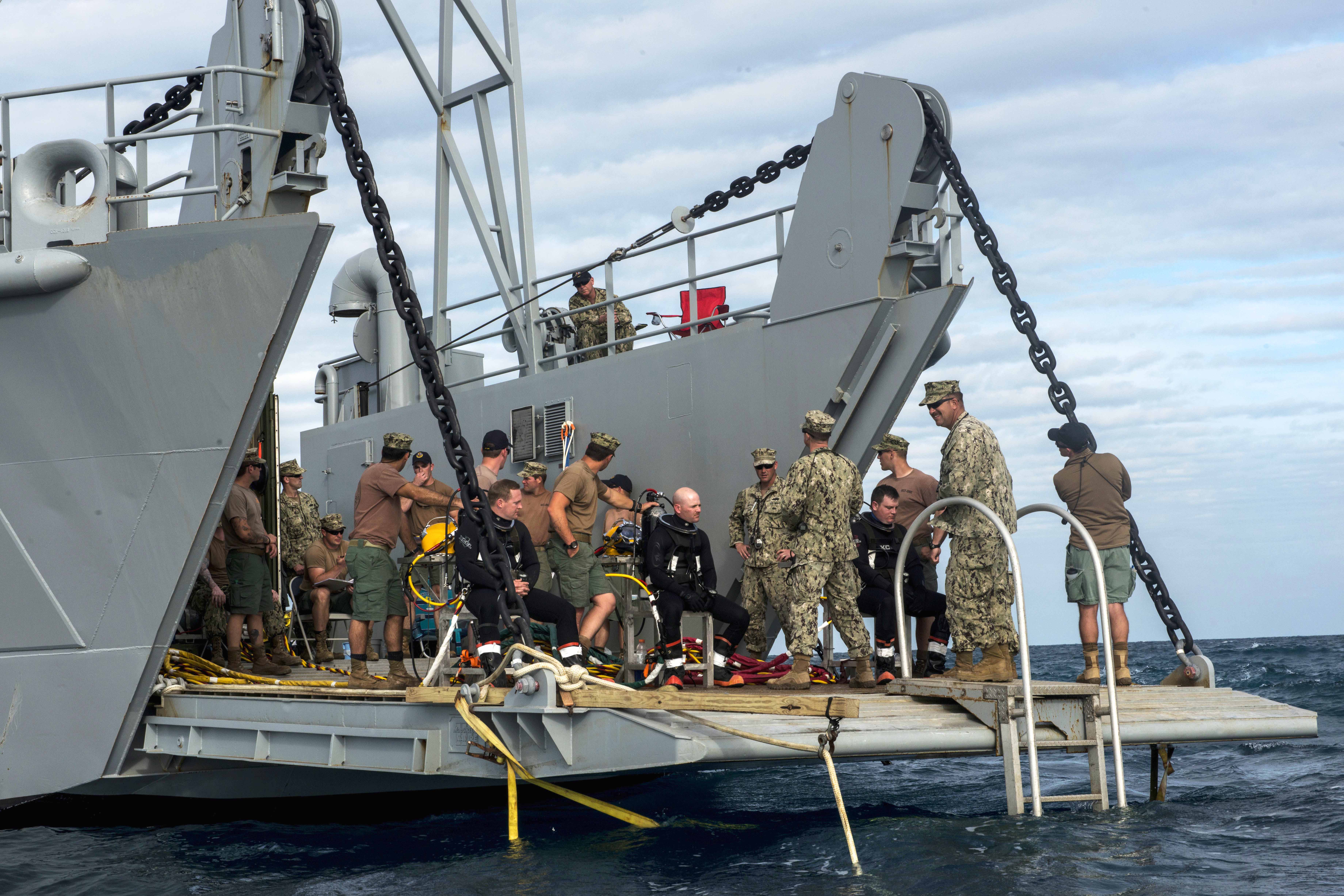 Navy Seabees conduct surface supplied diving operations during diver ...