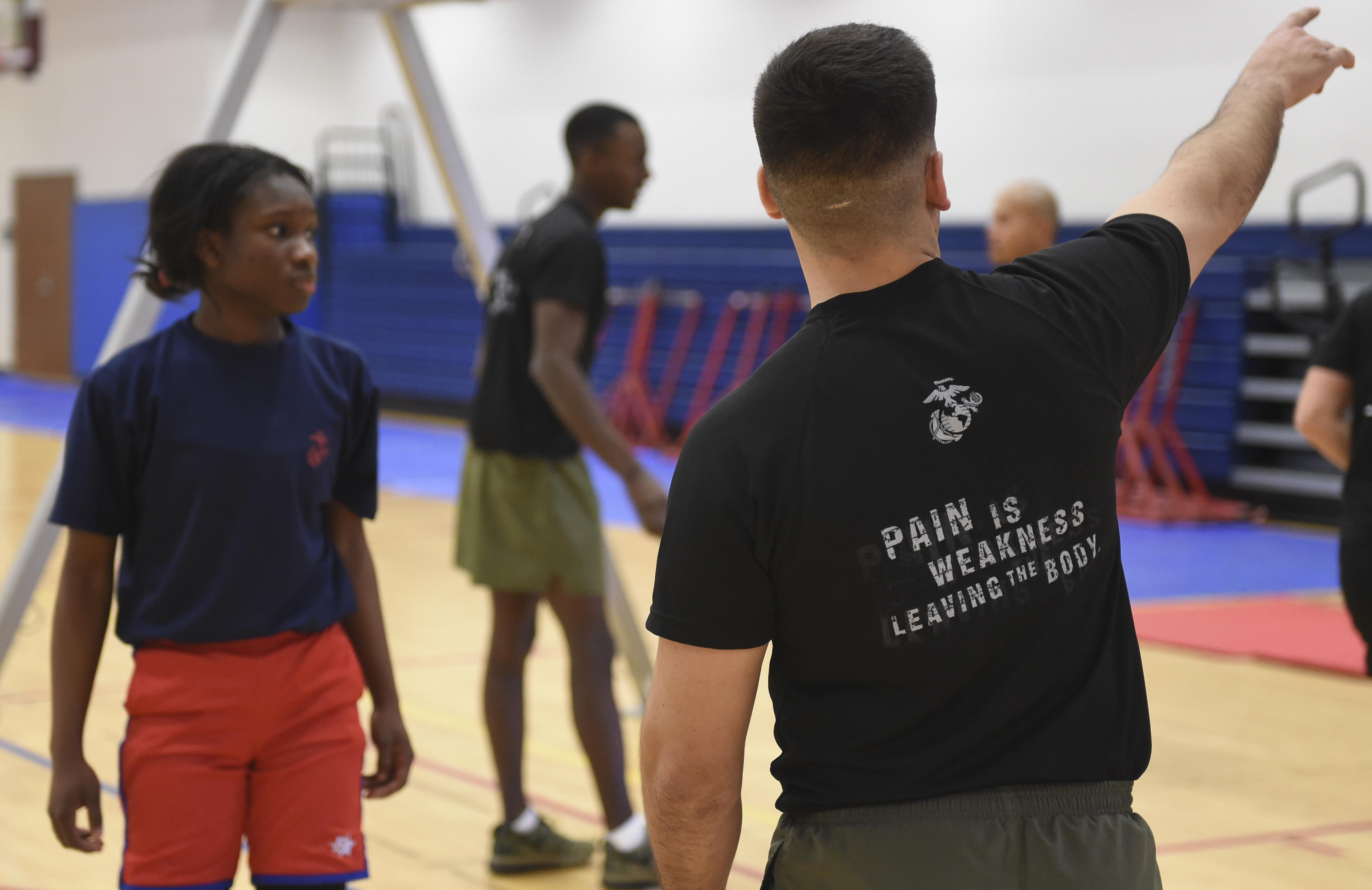Female U.S. Marine Corps poolees endure DEP workout