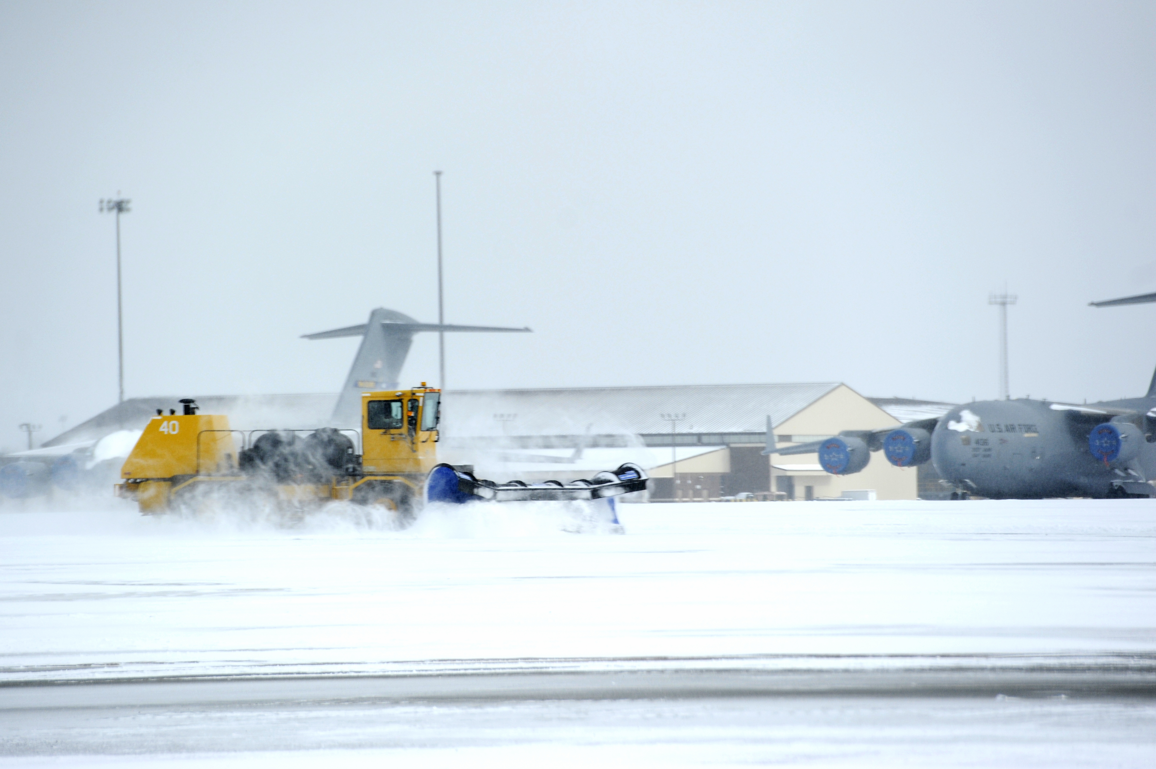 Snow dogs plow through snow, clear flight line > Joint Base McGuire-Dix ...