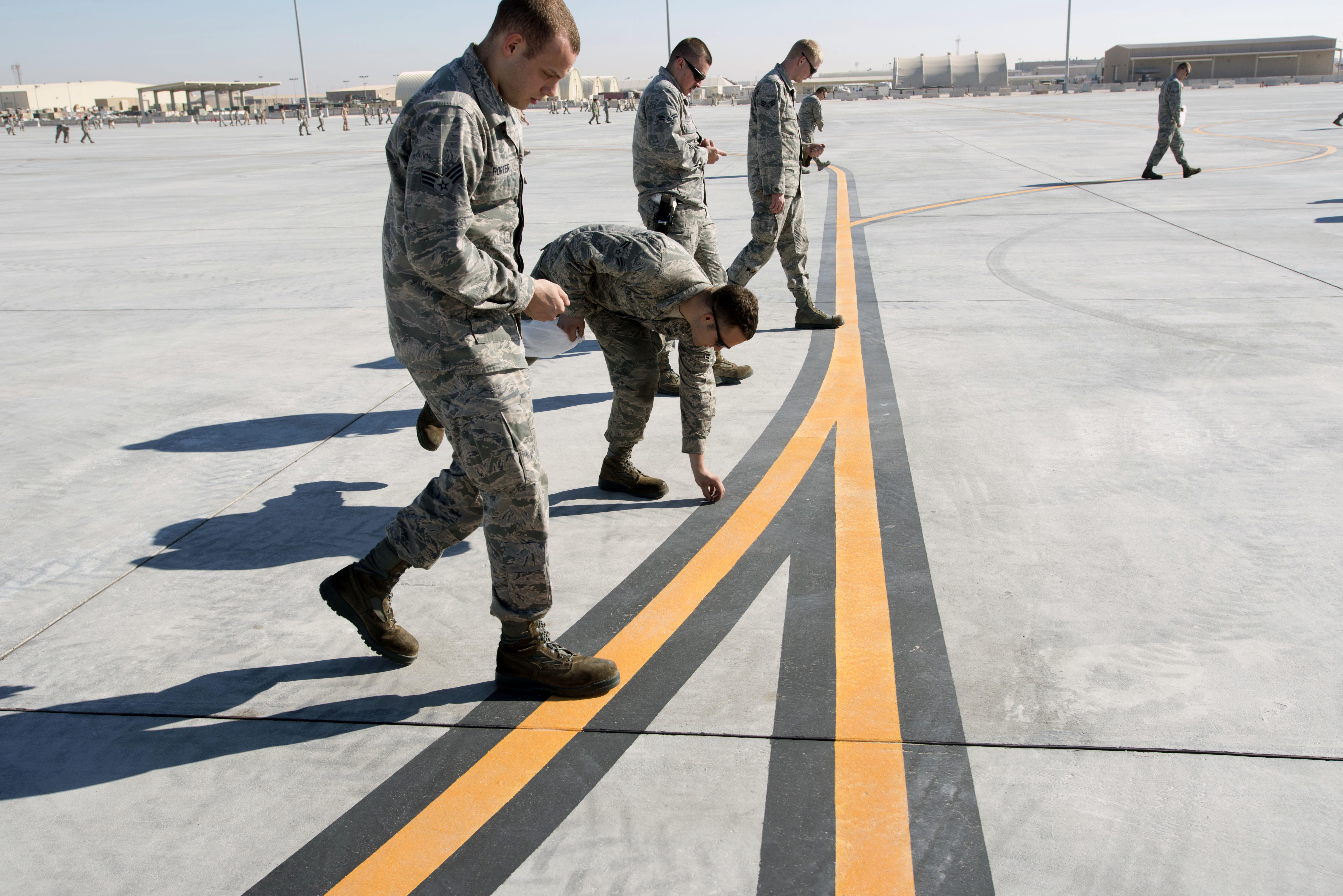 Al Udeid Airmen conduct first FOD walk on new tactical ramp > U.S. Air ...