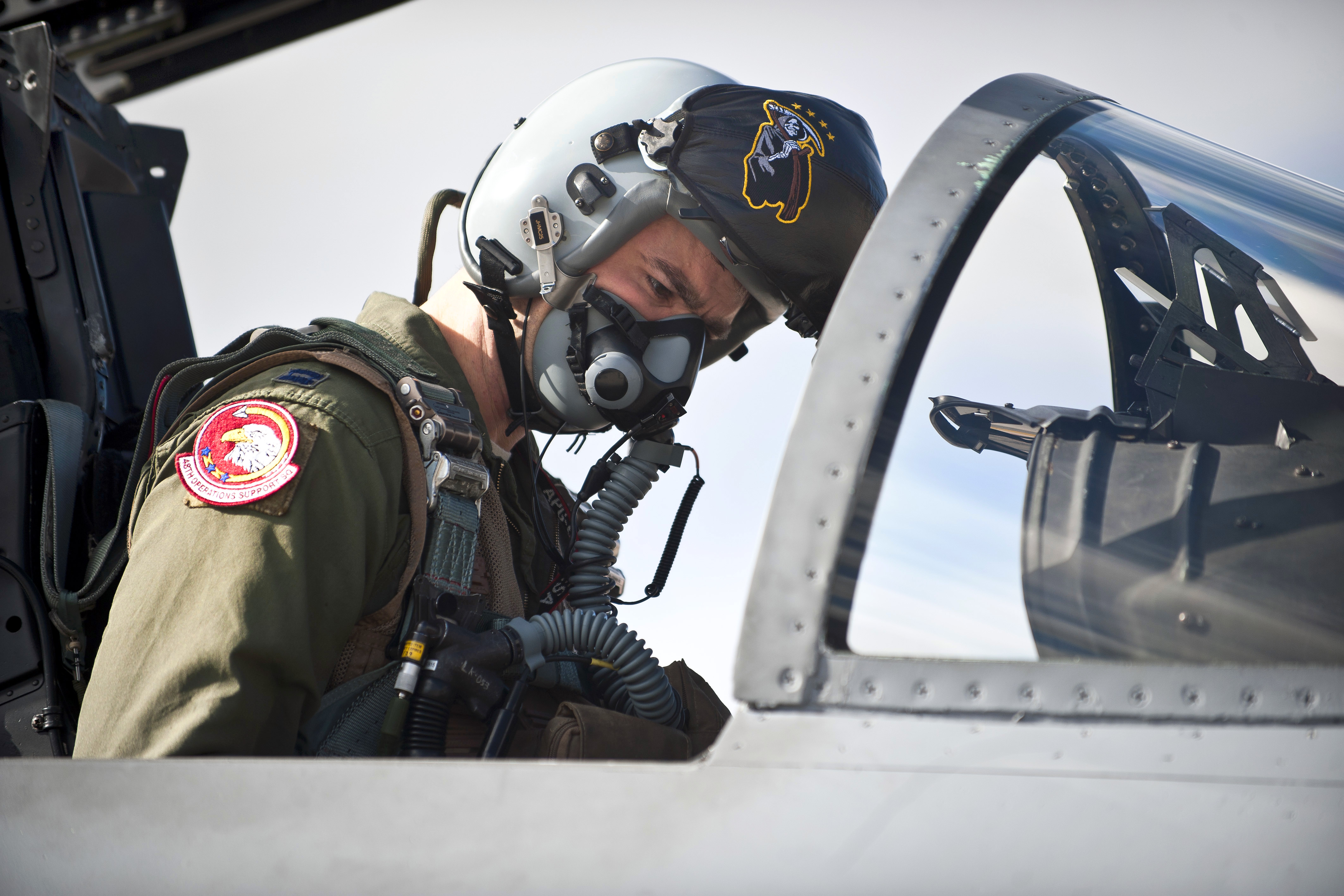 U.S. Air Force Capt. Joshua Tweedy prepares his F-15 Eagle for a flight ...