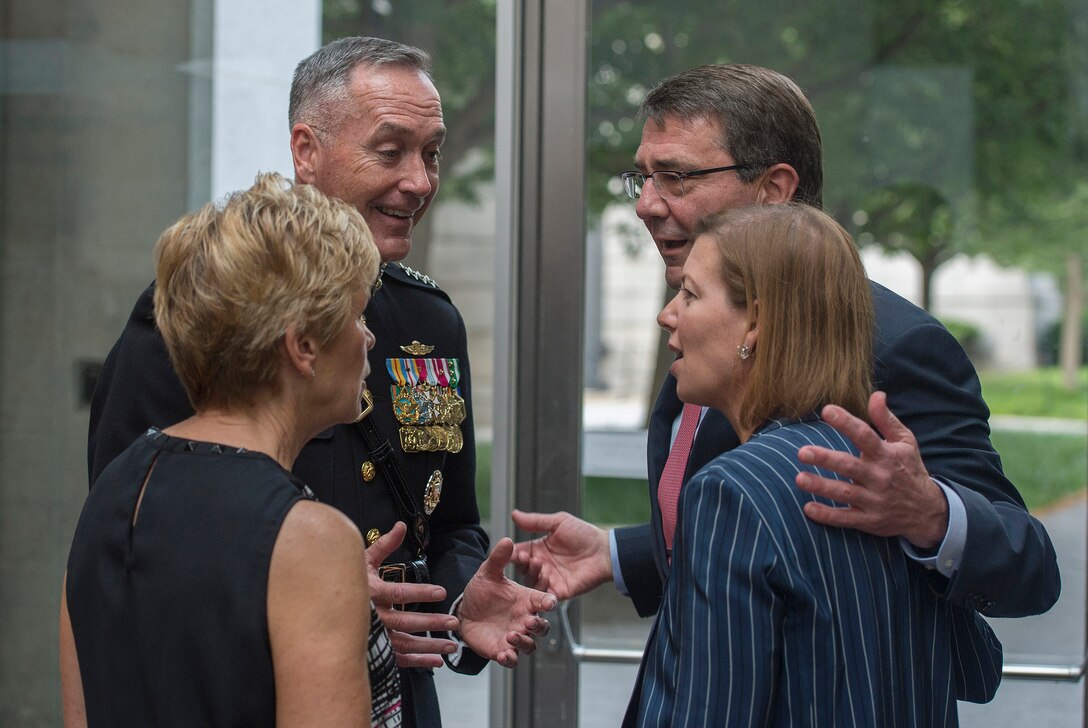 Defense Secretary Ash Carter and his wife, Stephanie, speak with Marine ...