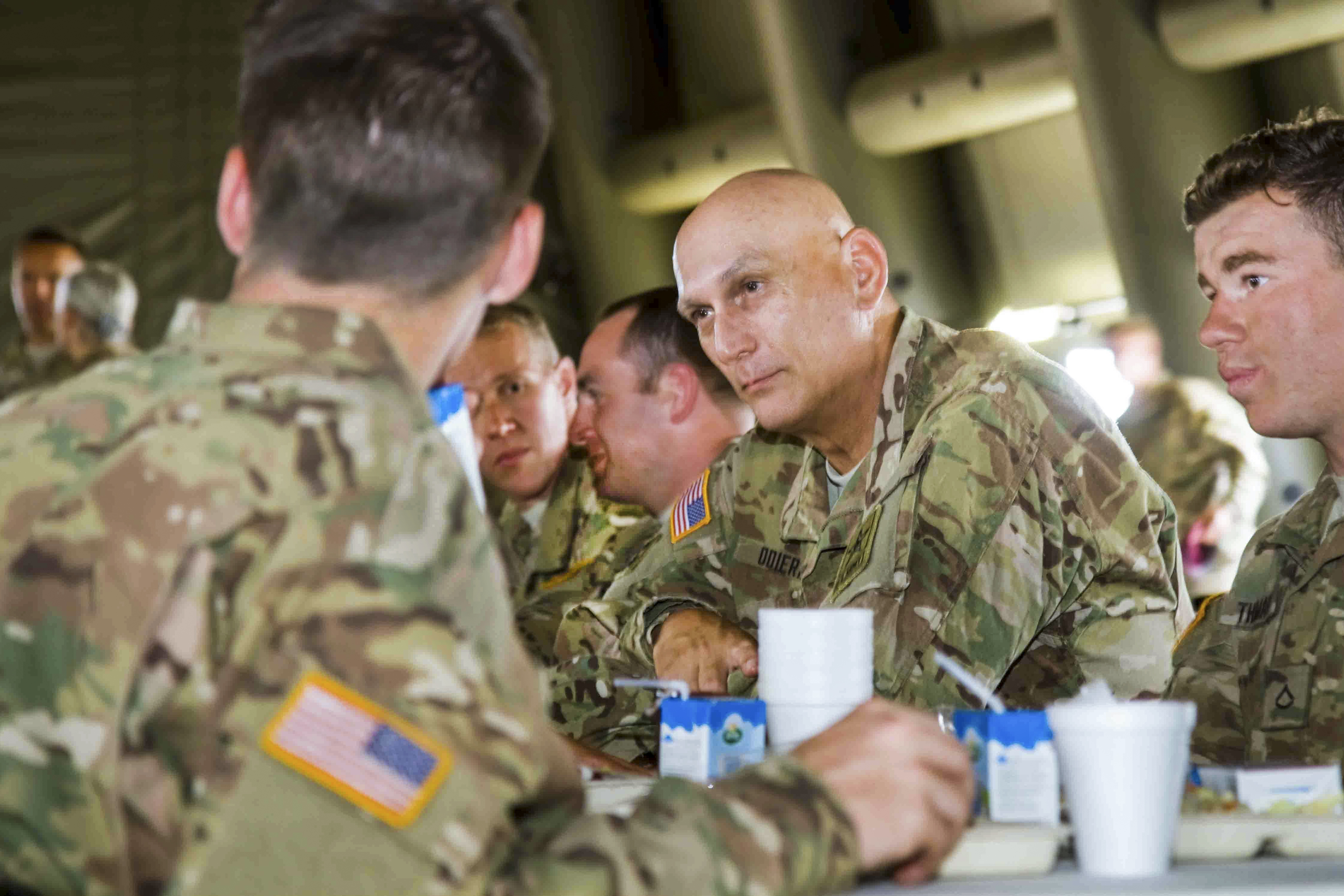 U.S. Army Chief of Staff Gen. Ray Odierno, center, talks with soldiers ...